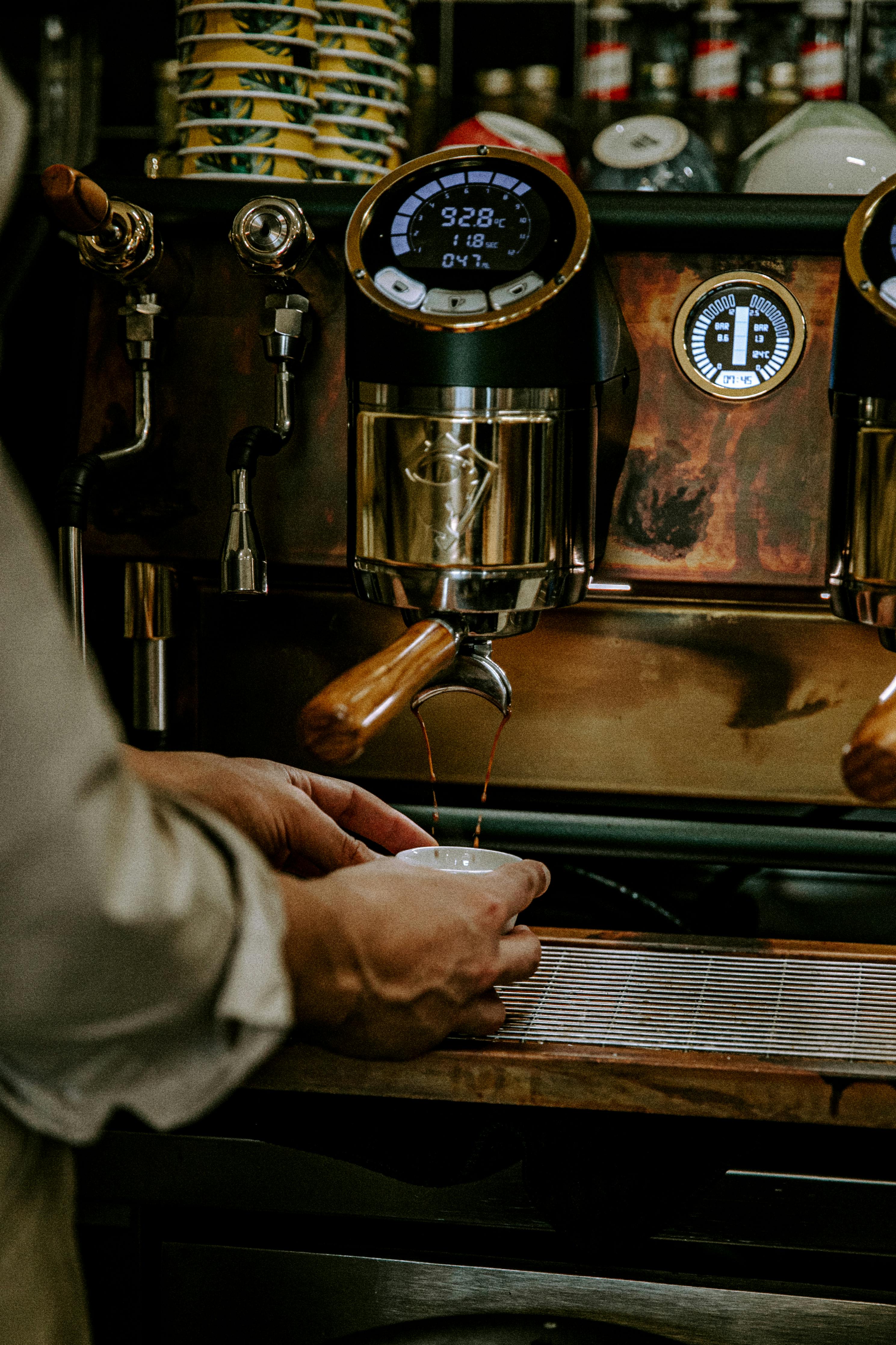Person Using Espresso Machine · Free Stock Photo