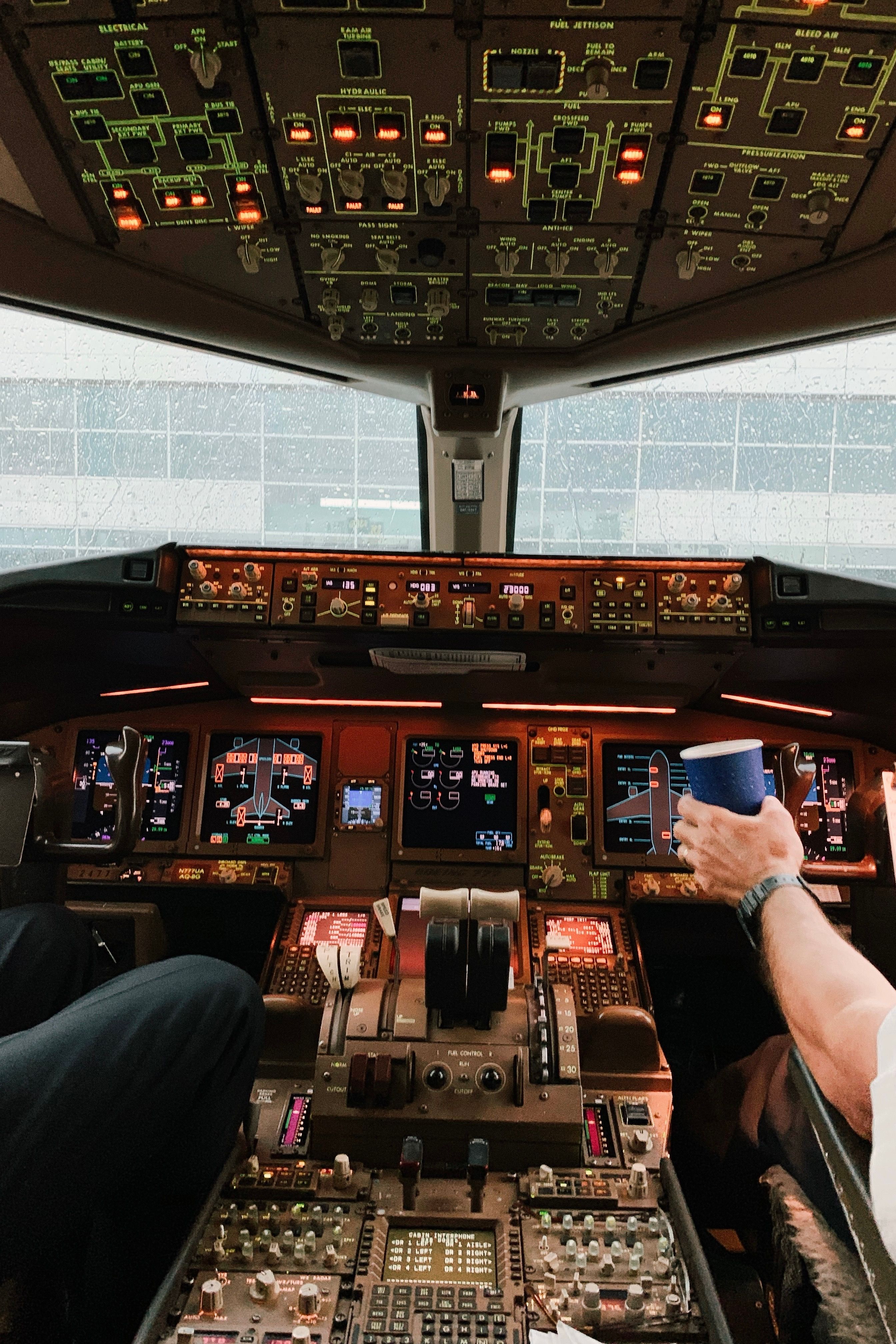 Person Controlling Flight Simulator · Free Stock Photo