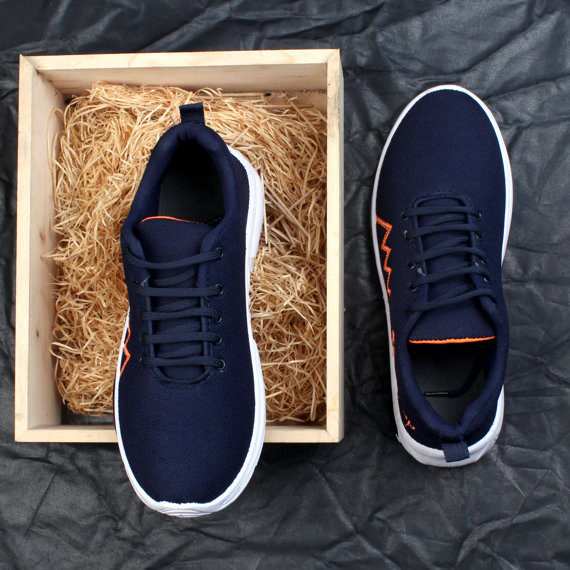 Pair of Navy Blue Sports Shoes and a Wooden Box · Free Stock Photo