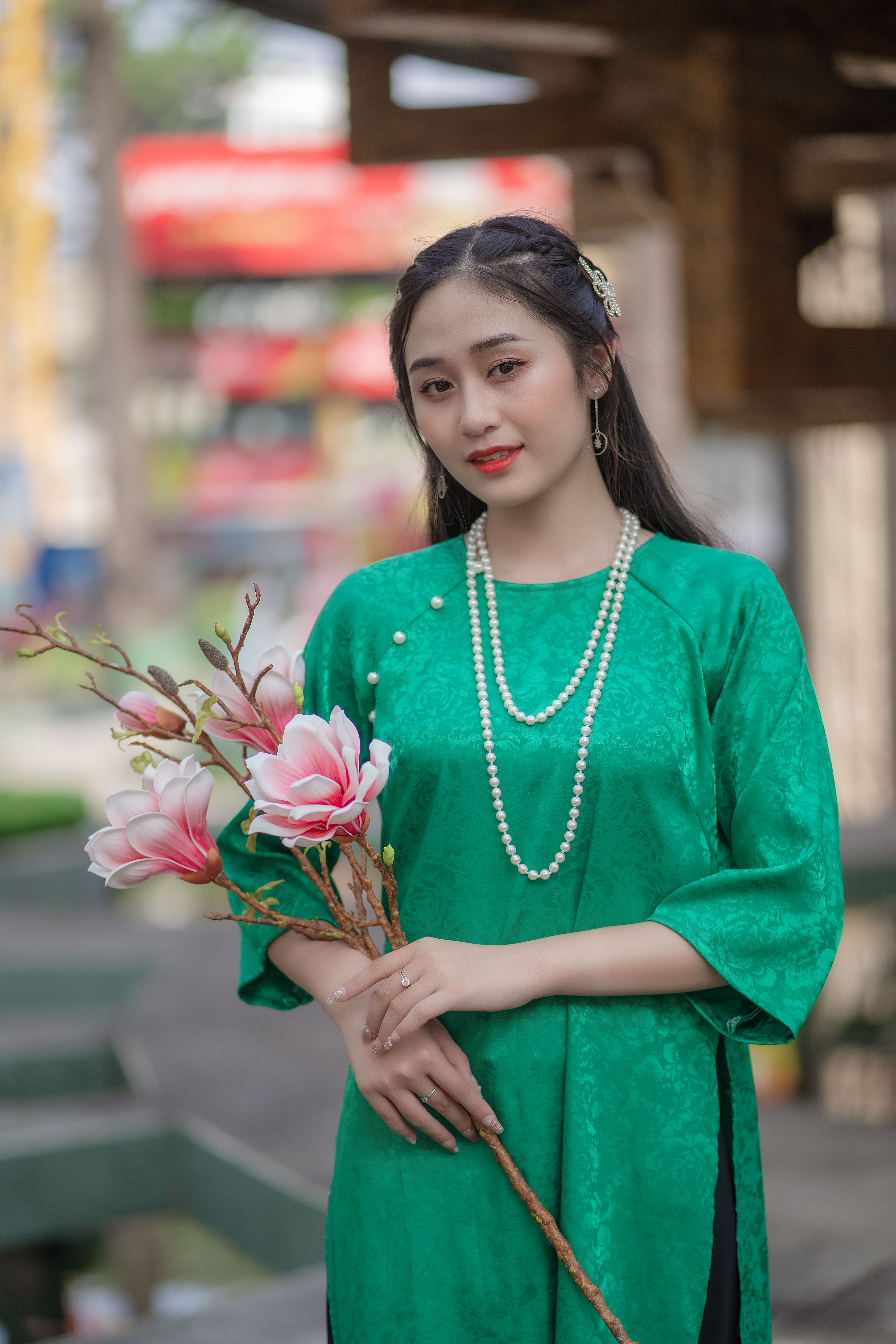 Model Posing in Emerald Dress · Free Stock Photo