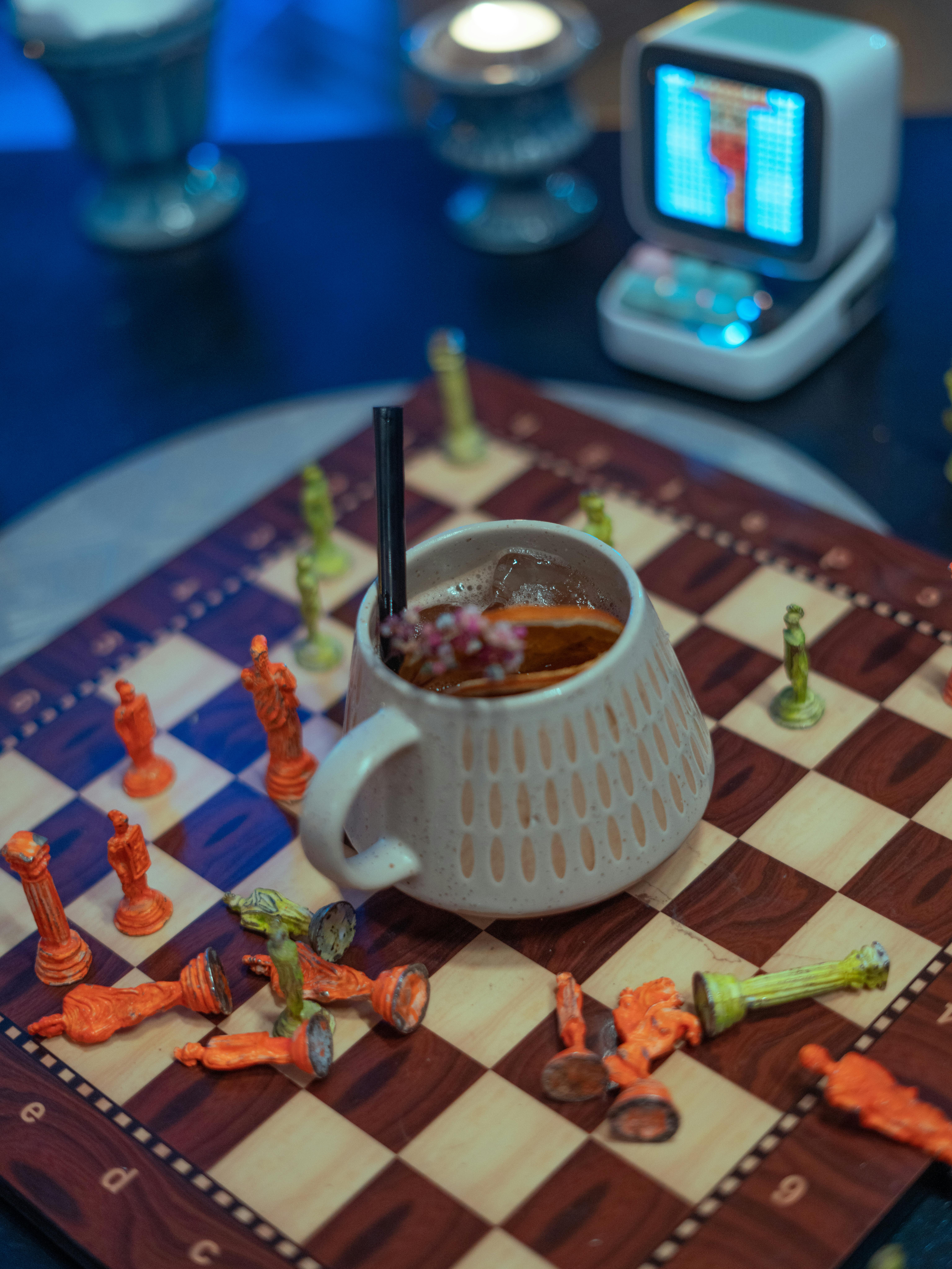 Cup of Iced Drink on a Chess Board · Free Stock Photo