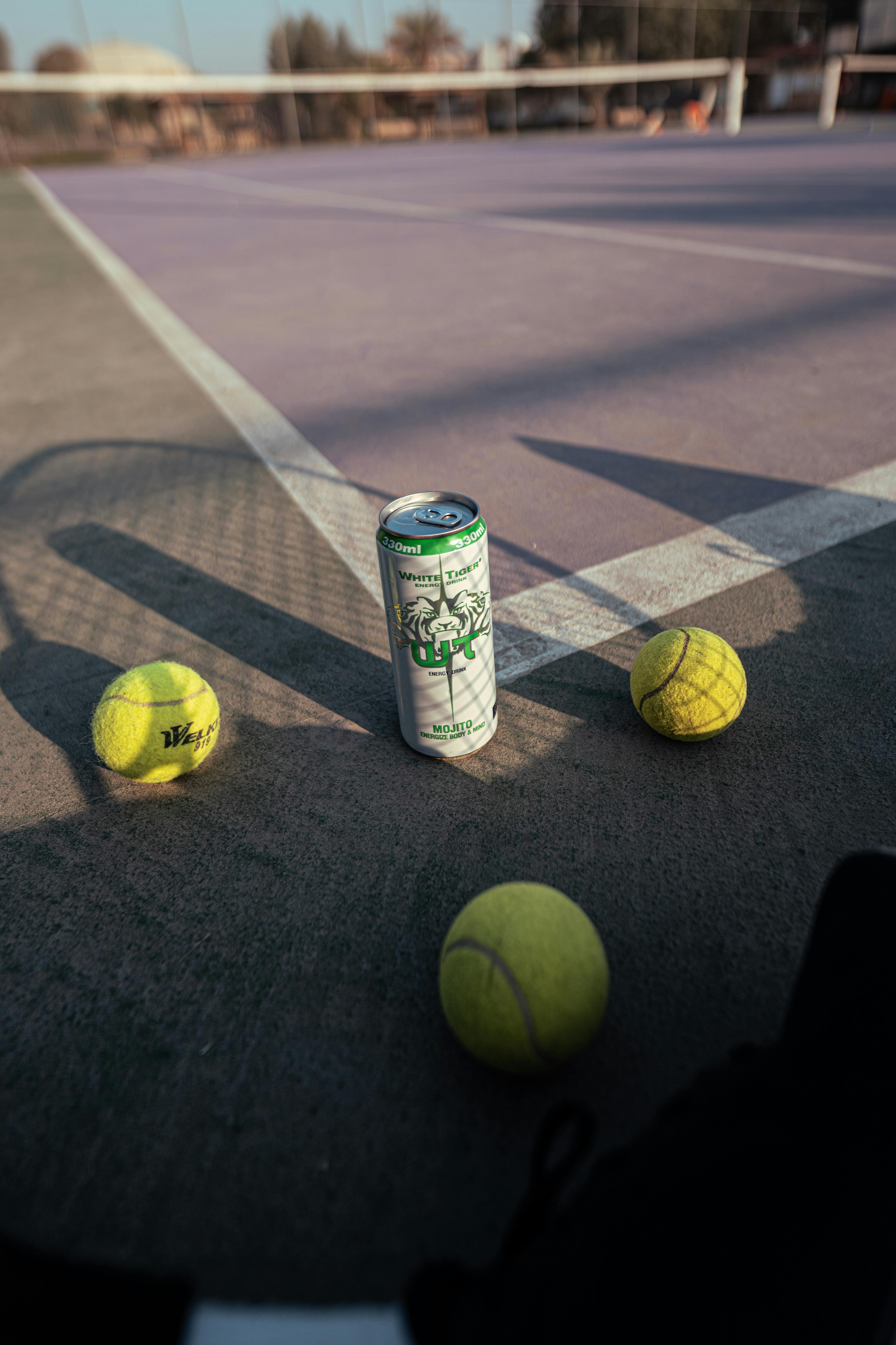Tennis Ball on Ground · Free Stock Photo