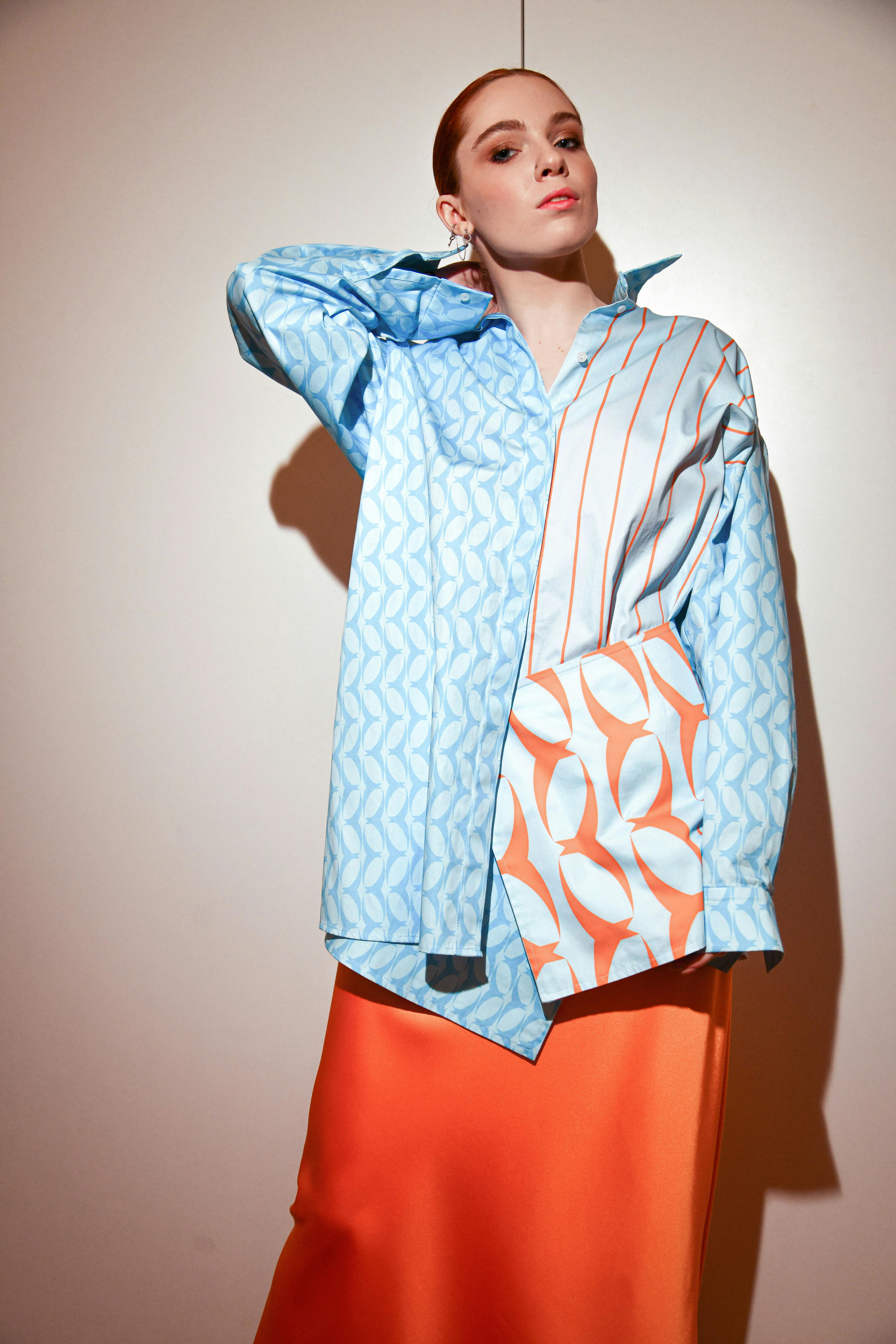 Woman Posing in Colorful Clothes · Free Stock Photo