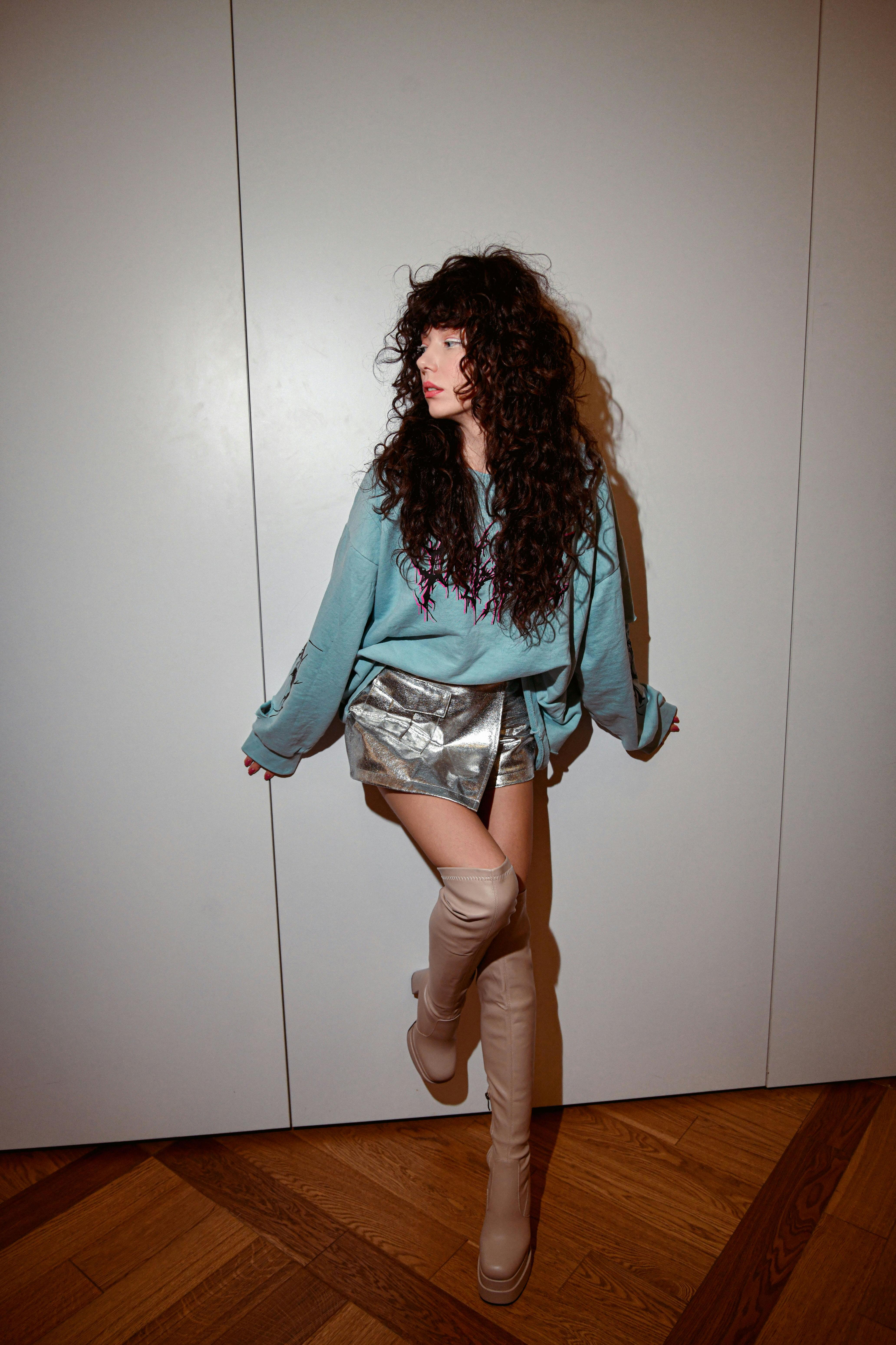 Woman Lying on Area Rug · Free Stock Photo