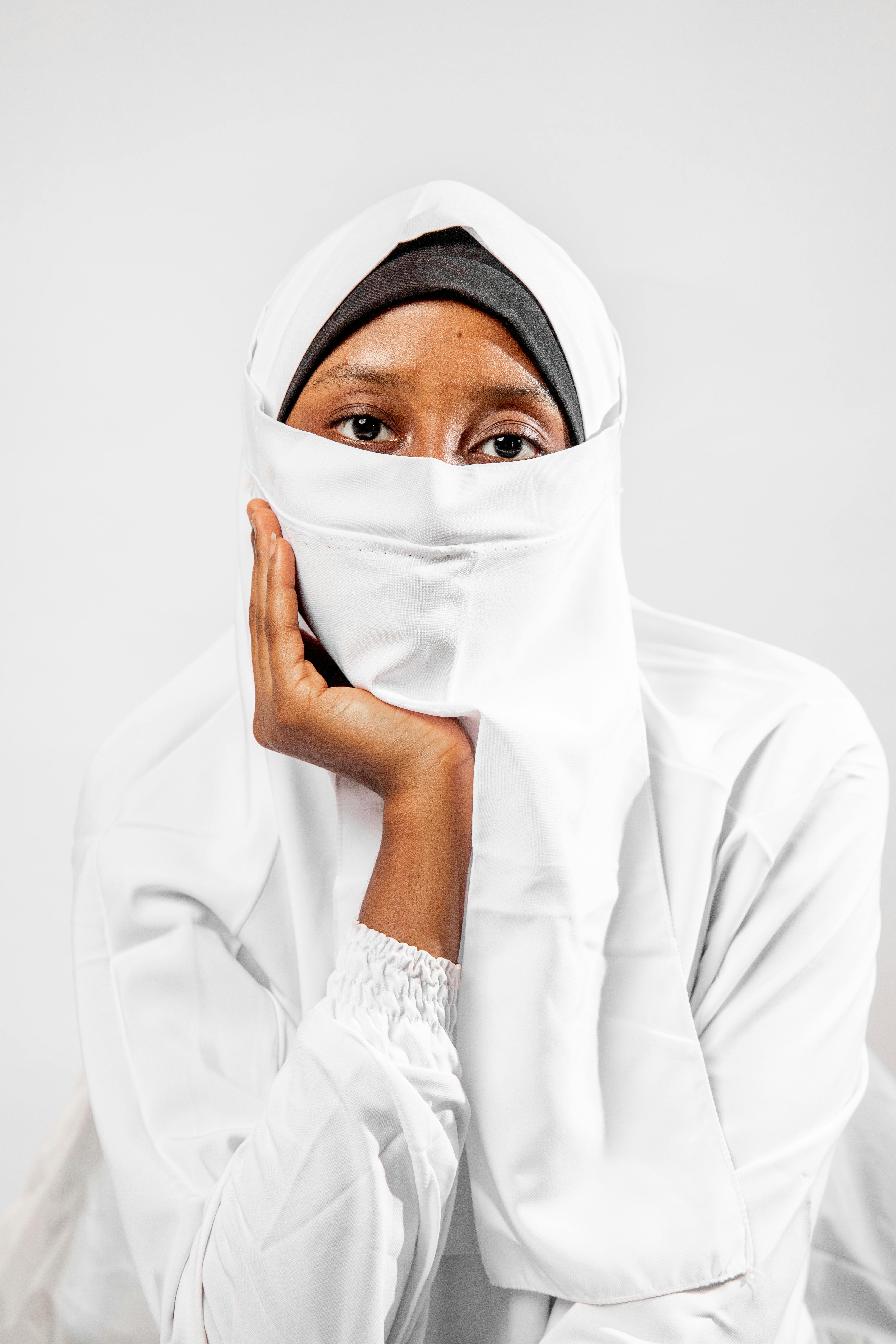Woman wearing Burqa Sitting on Bench · Free Stock Photo