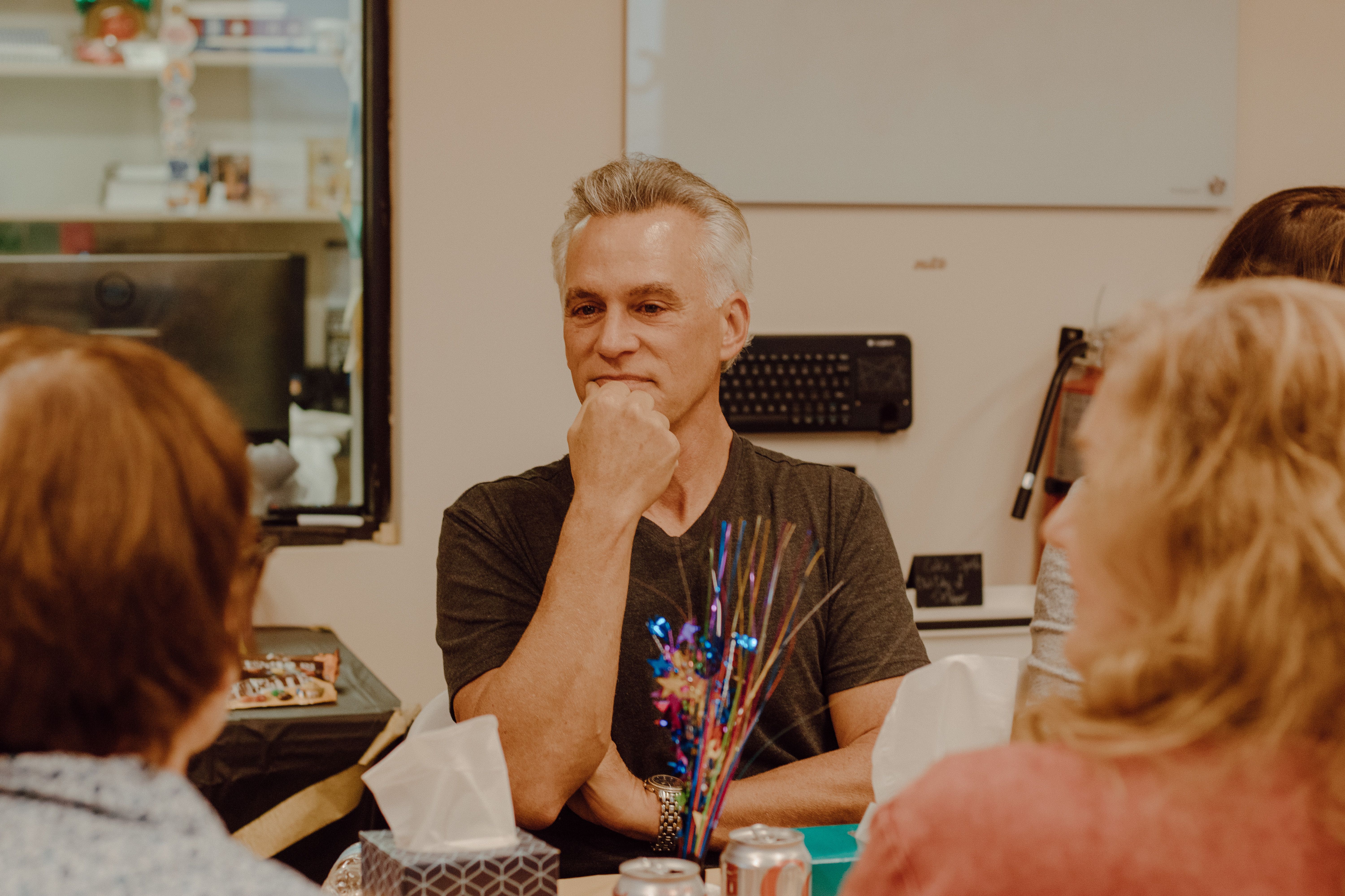 Man Standing behind Women and Thinking · Free Stock Photo