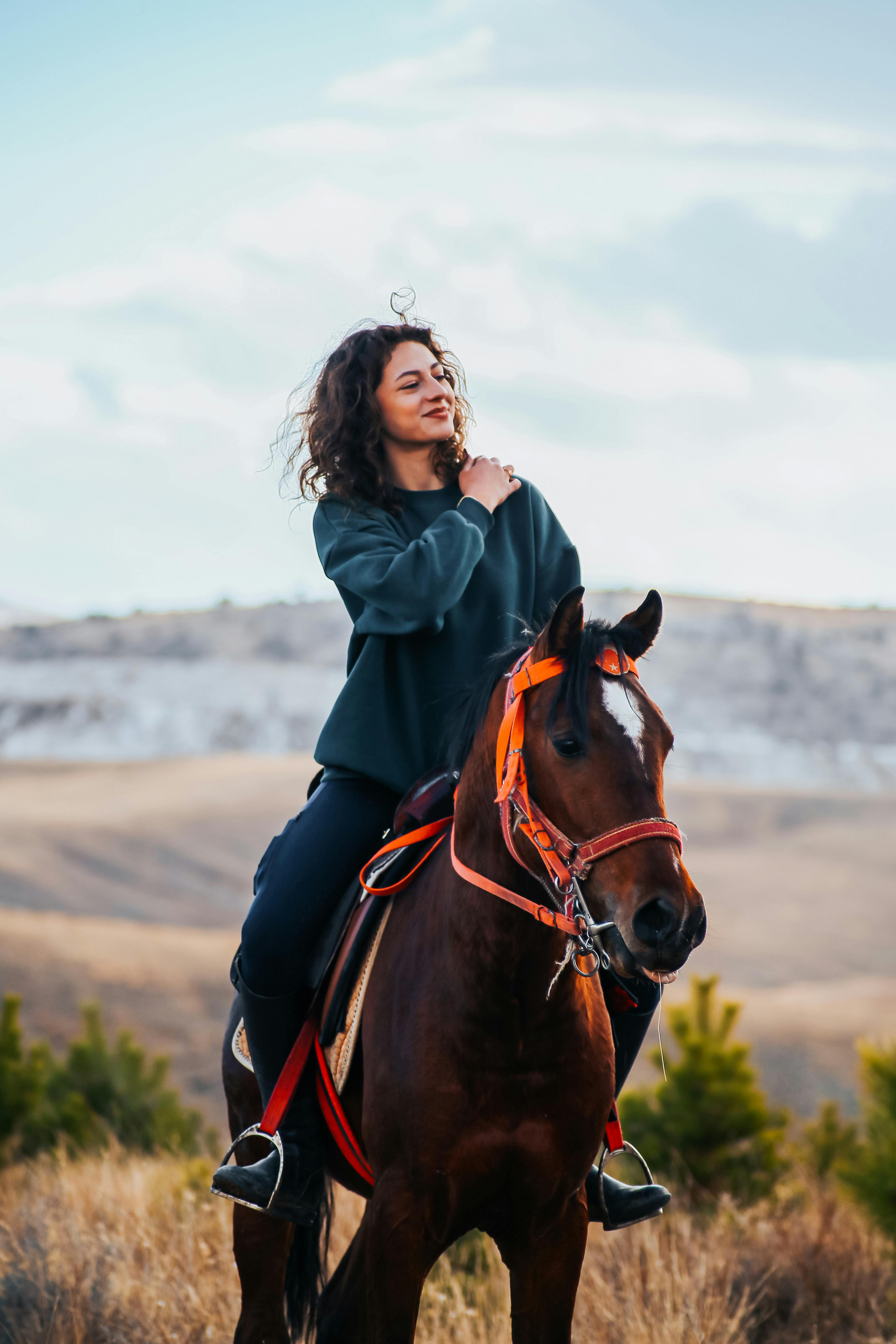 Woman Riding a Horse · Free Stock Photo