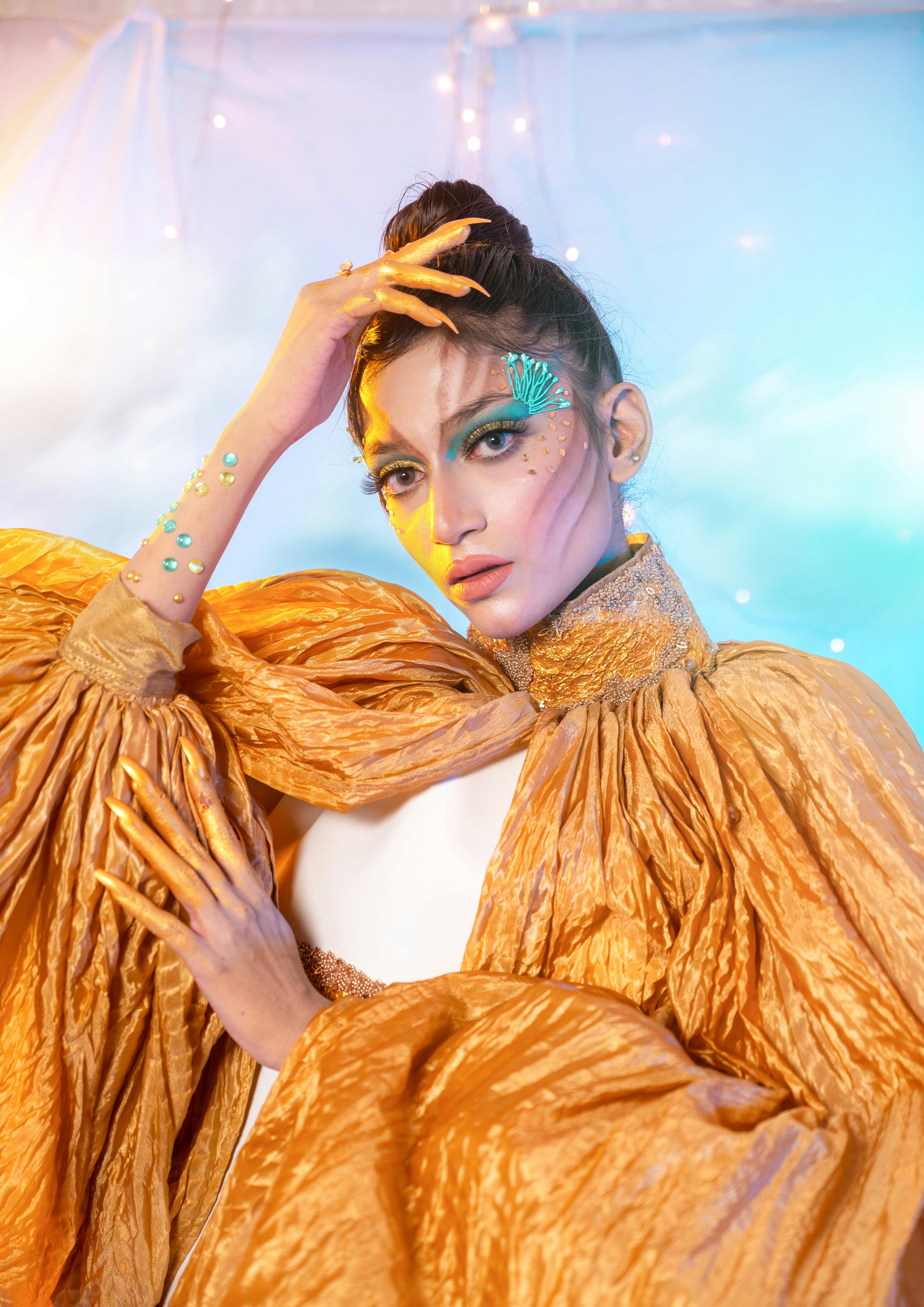 Woman in an Angel Costume with Flowers in the Background · Free Stock Photo