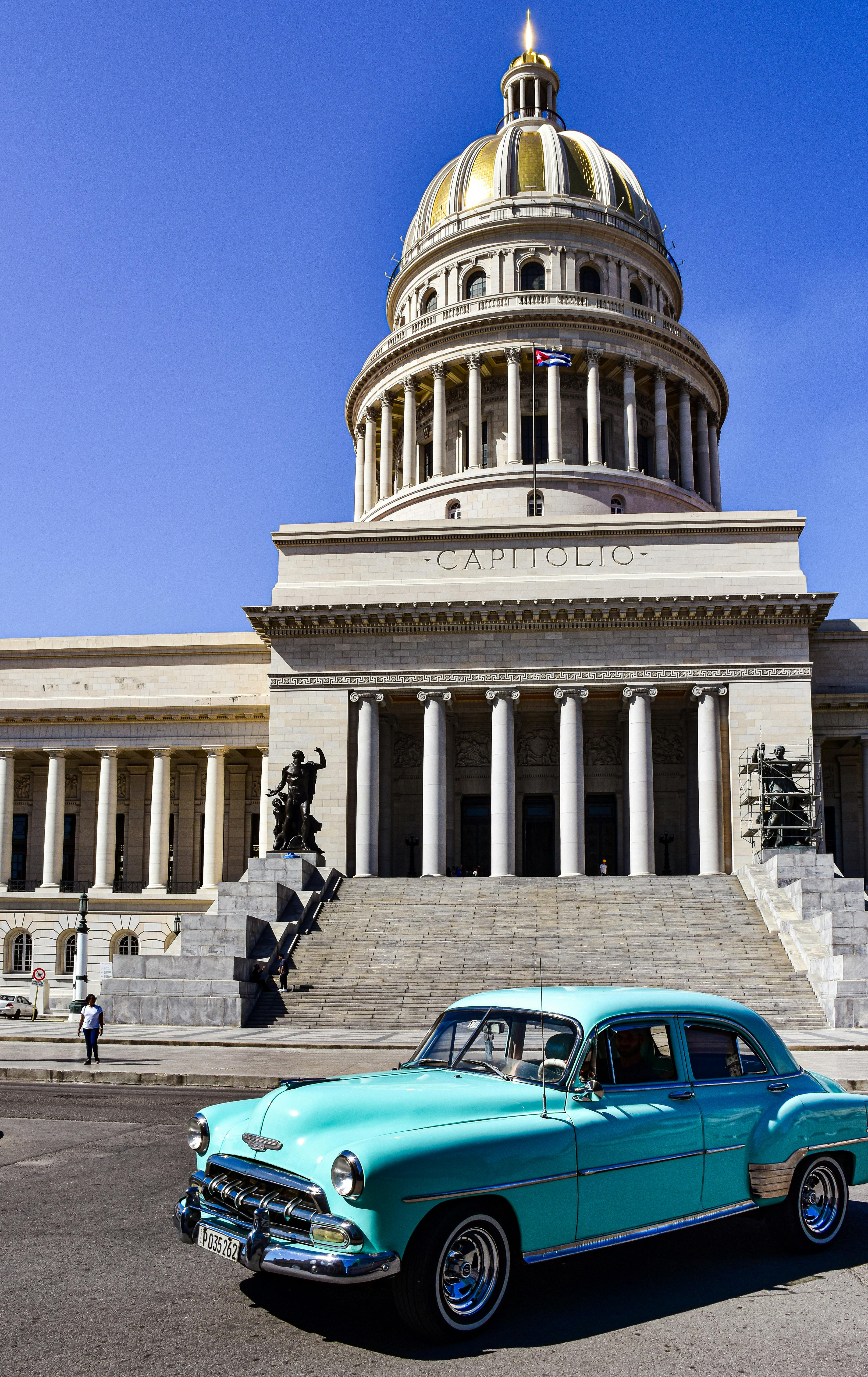 Classic Chevrolet Impala in front of National Capitol of Cuba · Free ...