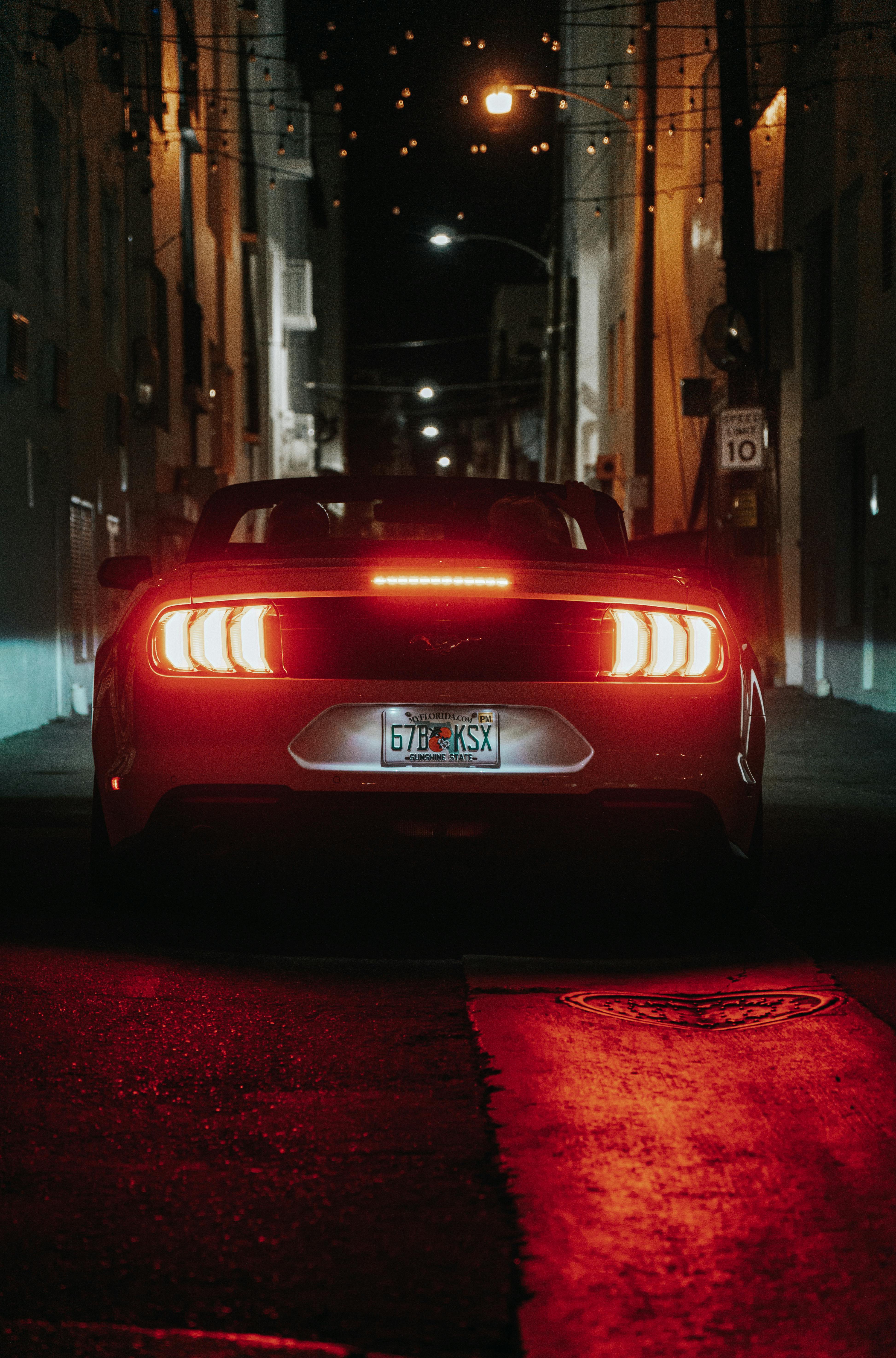 Rear View of a Car at Dusk · Free Stock Photo