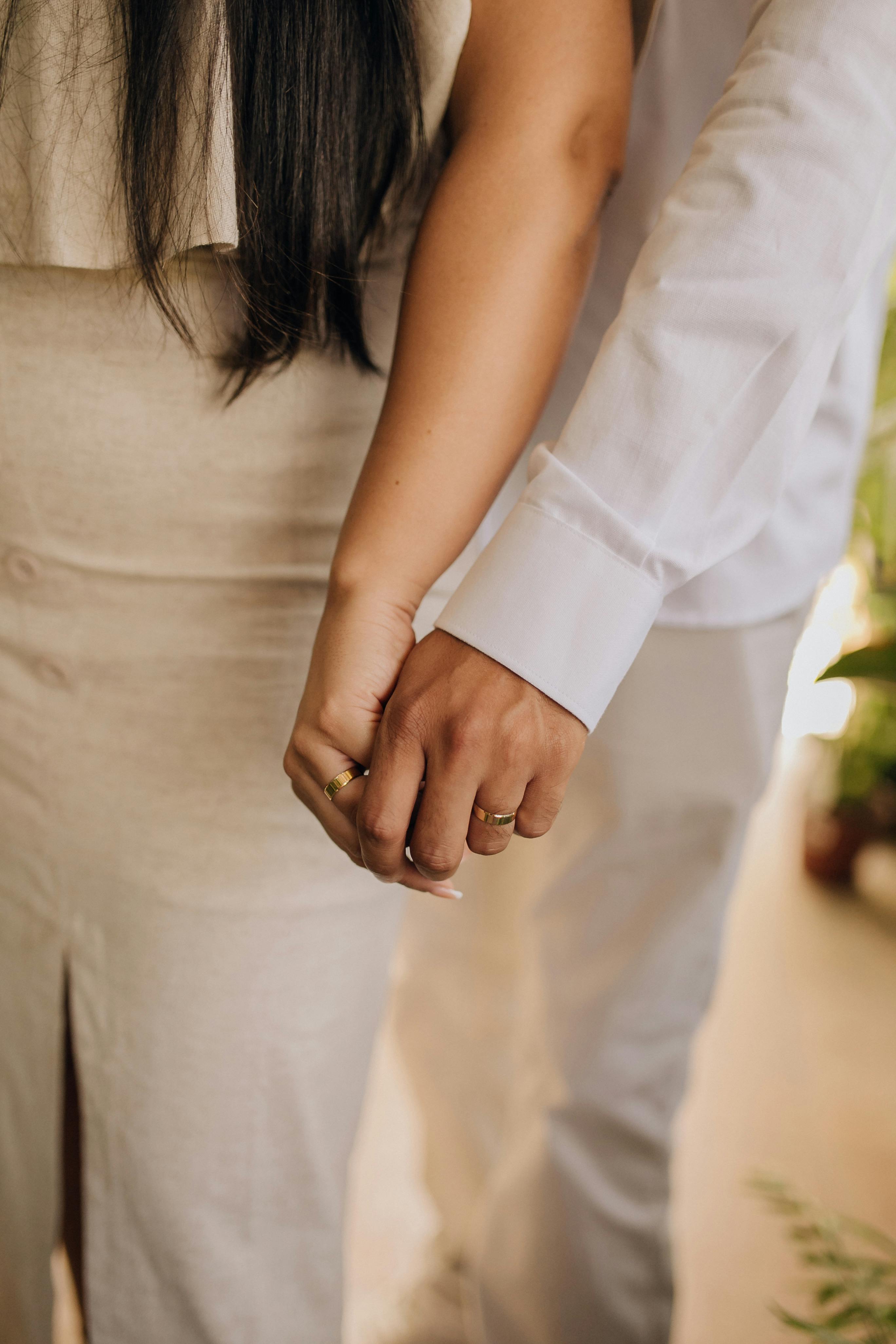 Couple Holding Hands · Free Stock Photo