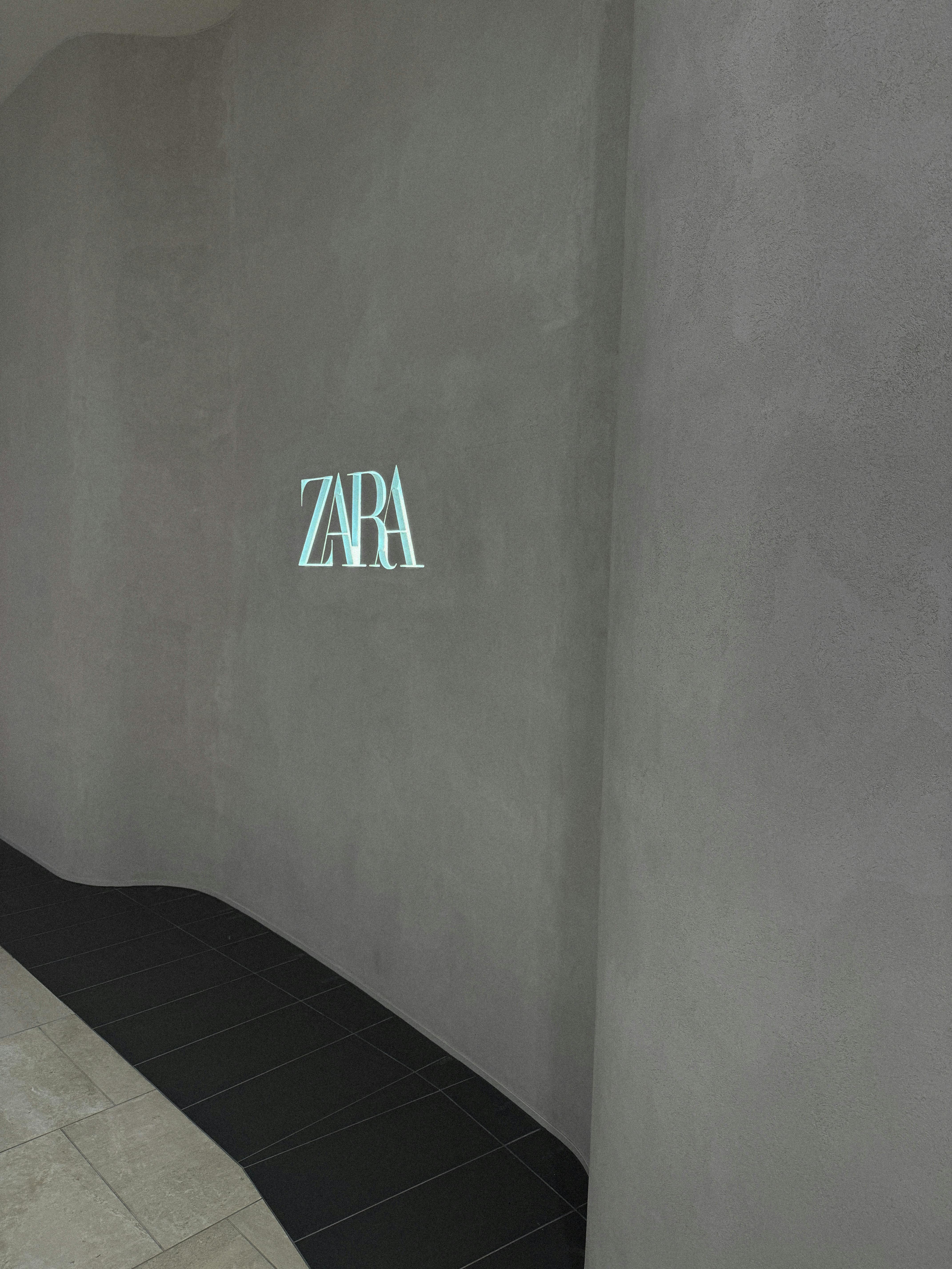 Zara Brand Name on White Background · Free Stock Photo