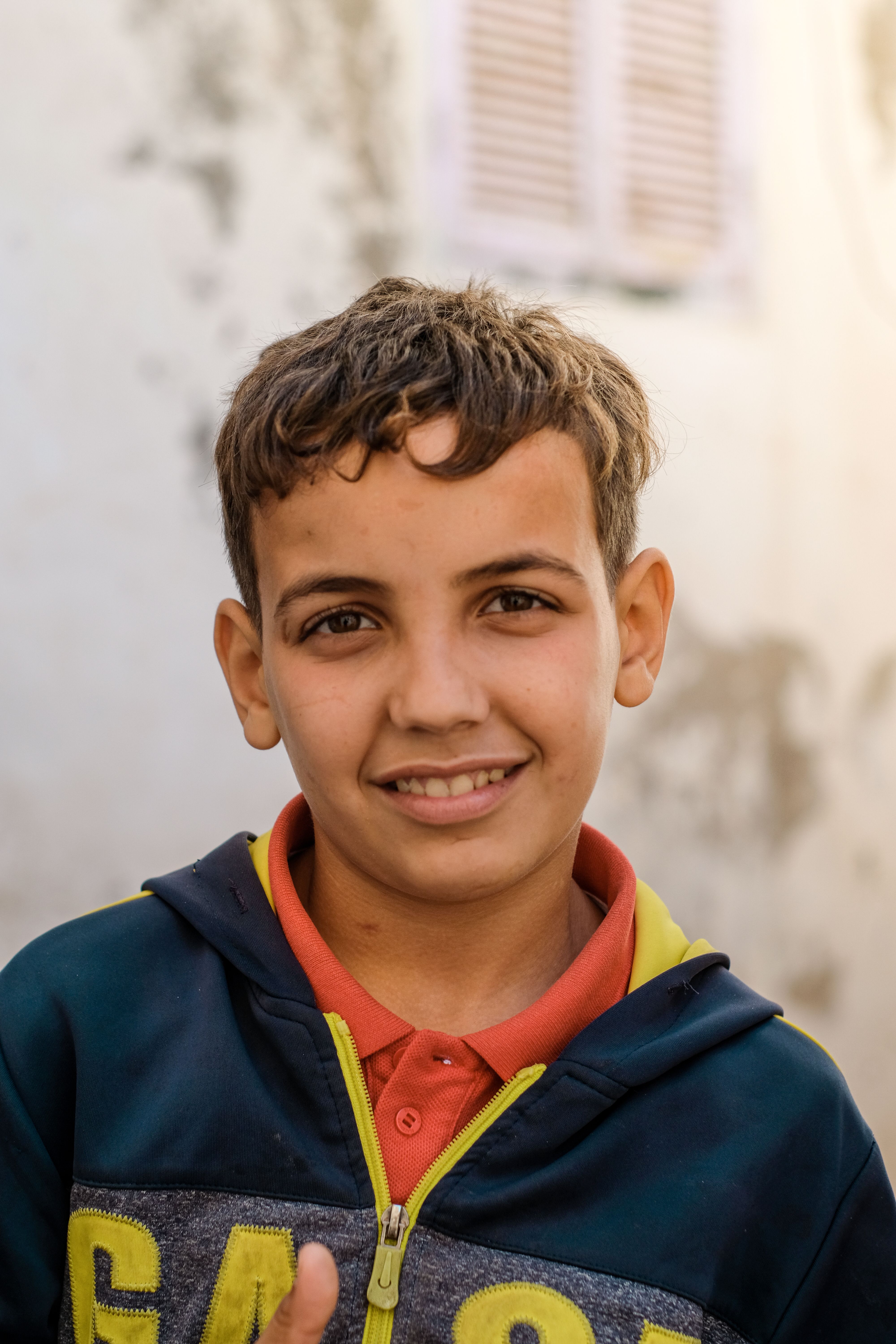 Portrait of Smiling Child on Street · Free Stock Photo