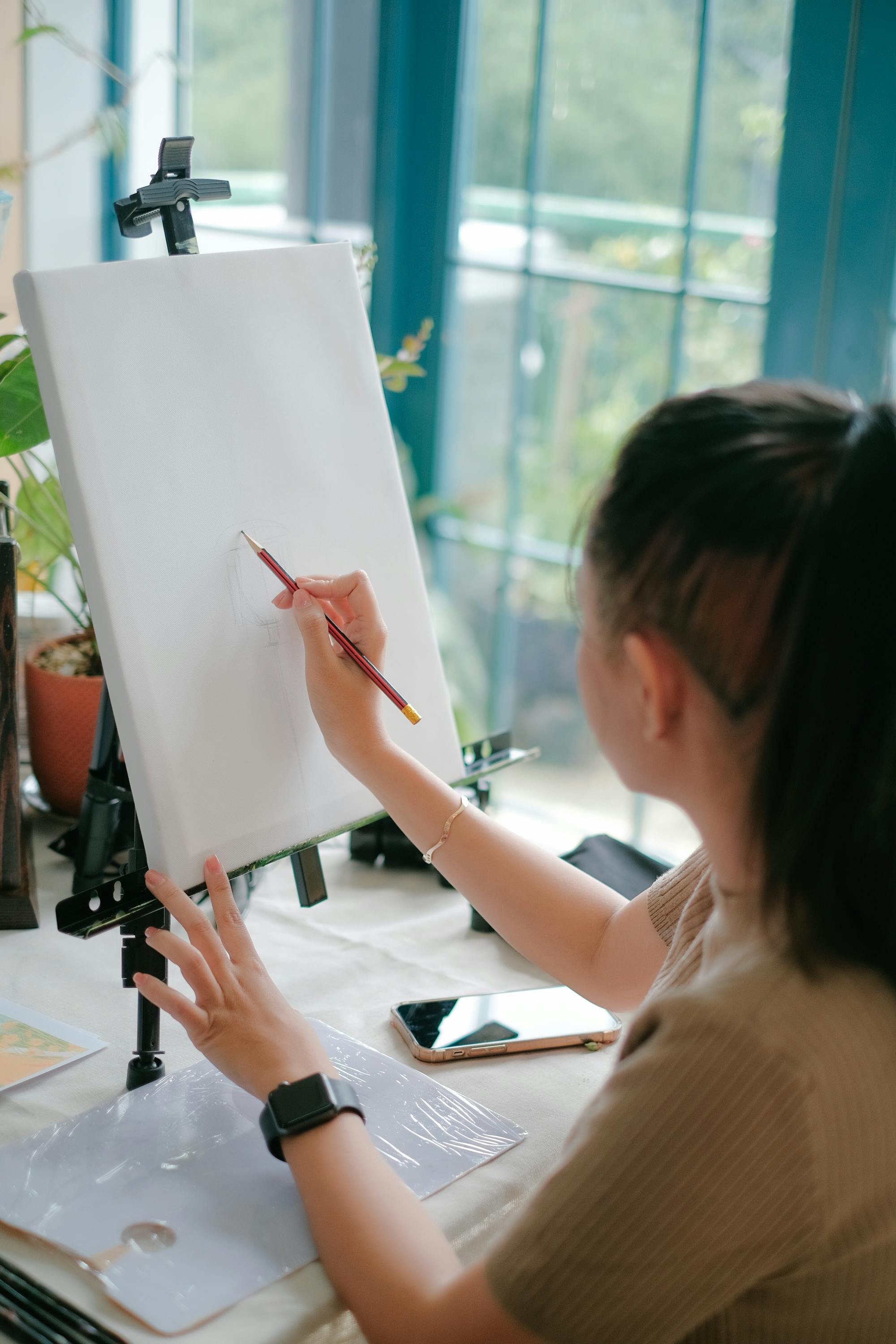 Girl Coloring with Color Pencil · Free Stock Photo