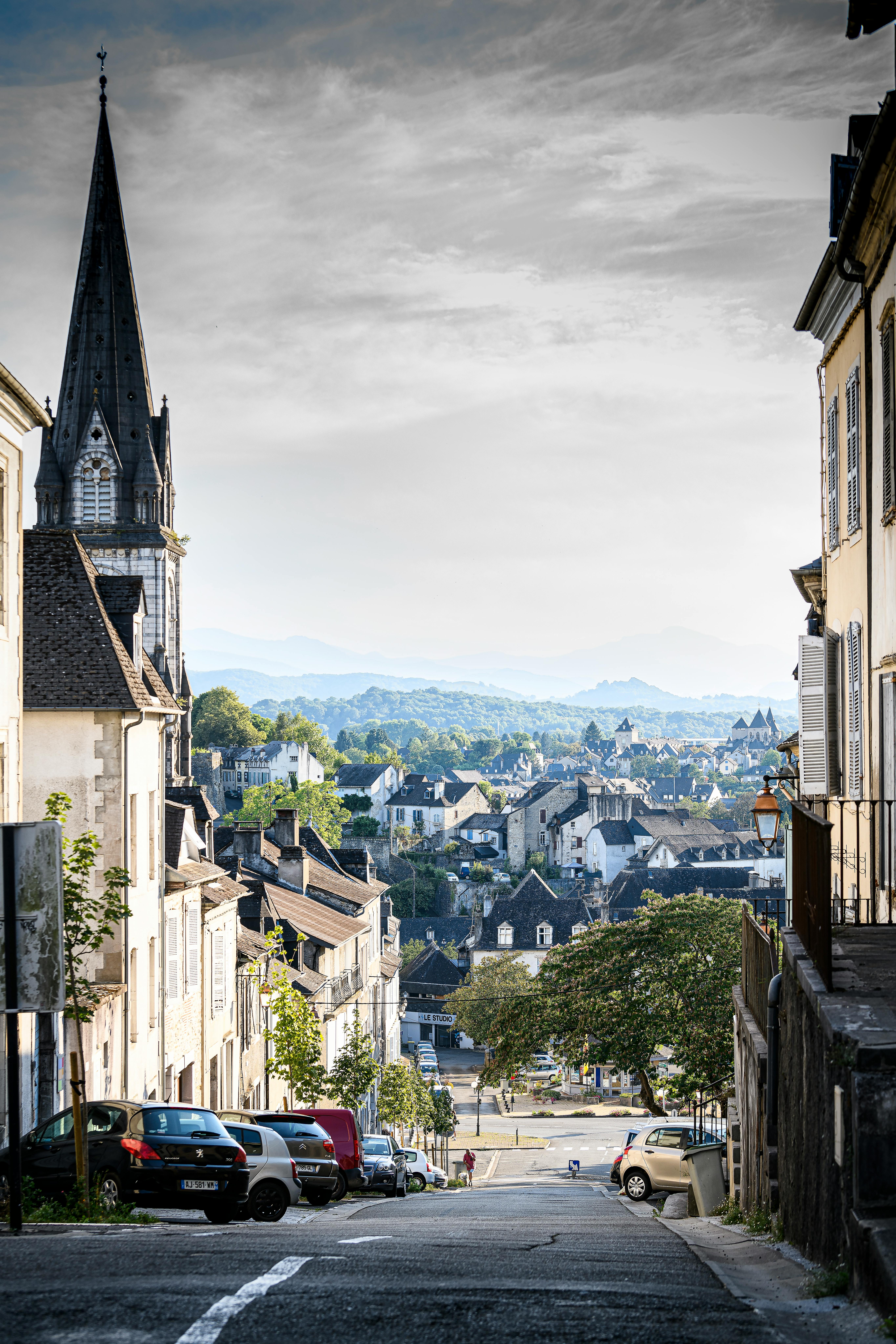 Gothic Buildings on City Street · Free Stock Photo
