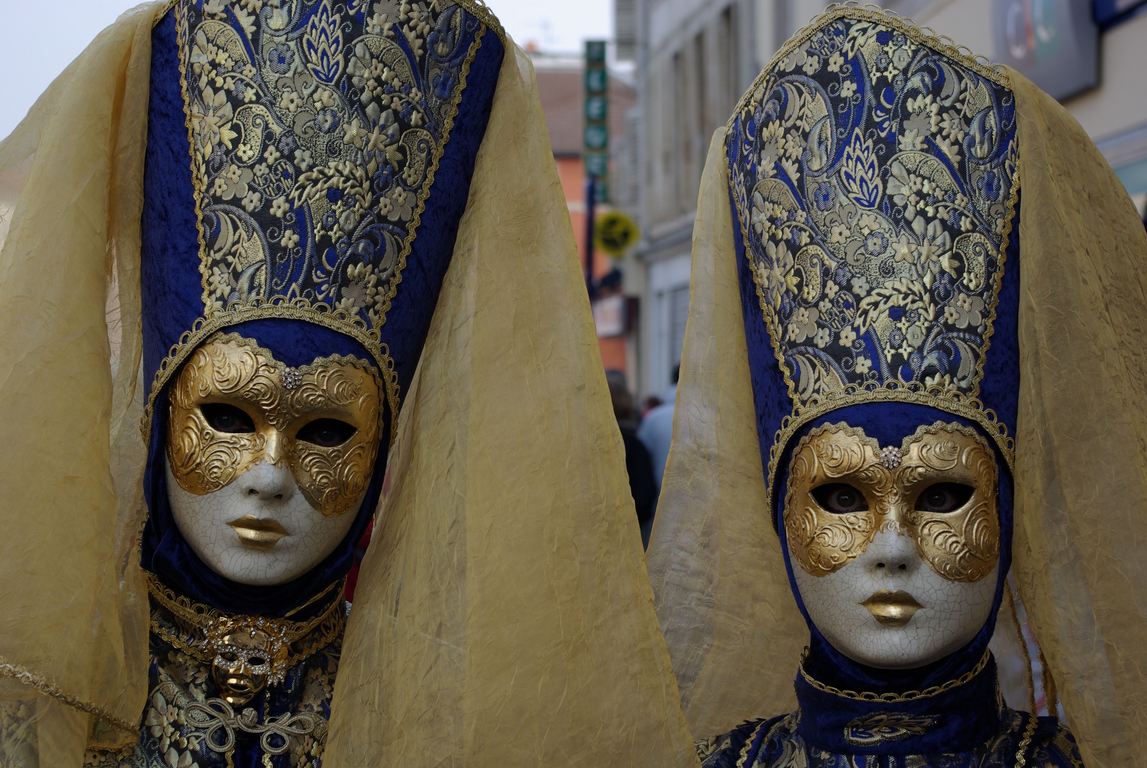 People in Golden Masks and Decorated Hats · Free Stock Photo