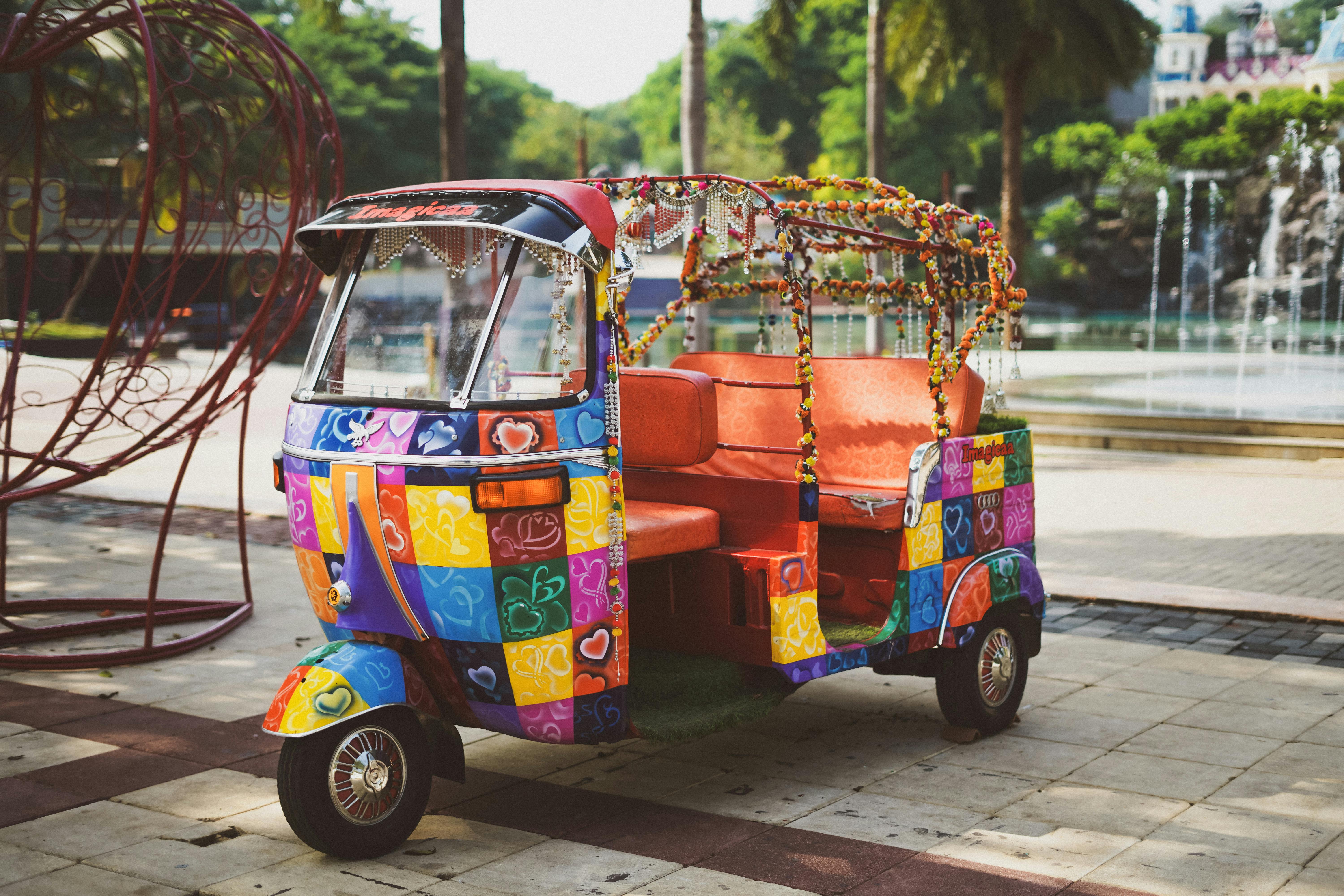 Colorful Auto Rickshaw in Park · Free Stock Photo