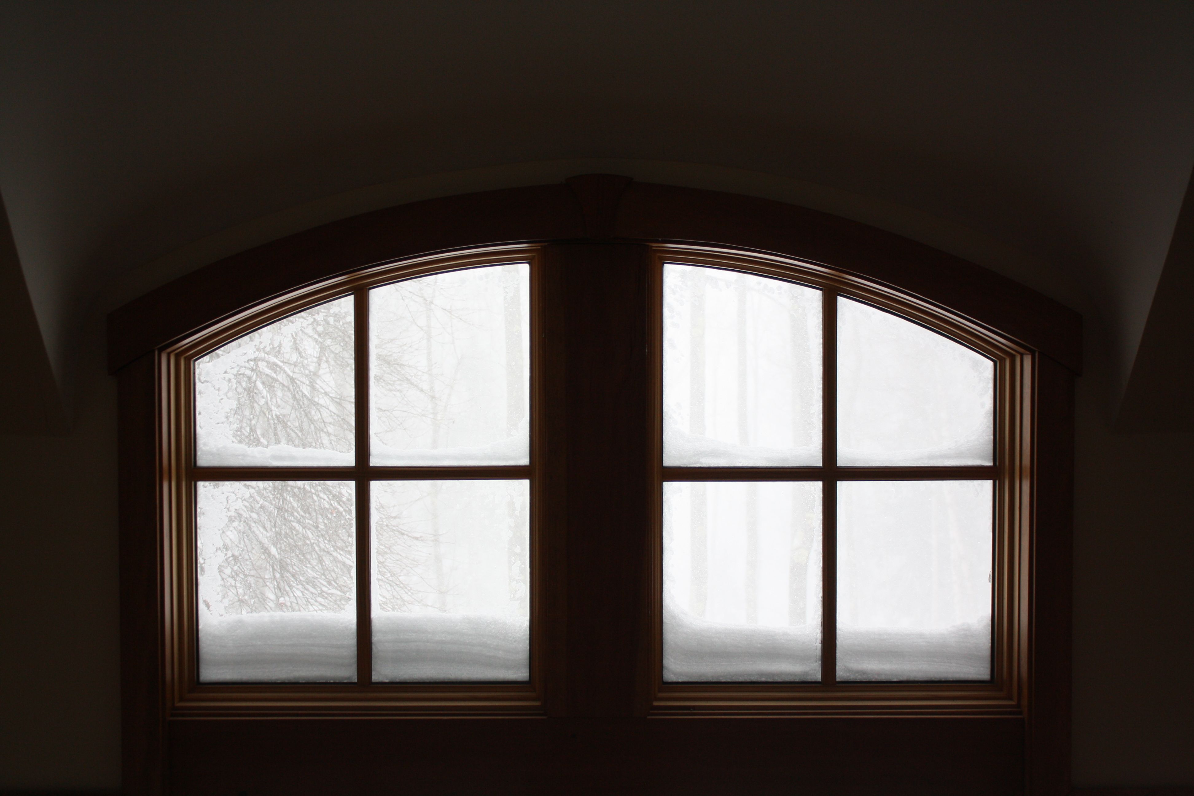 Arched Window with a View of Snow Covered Landscape · Free Stock Photo