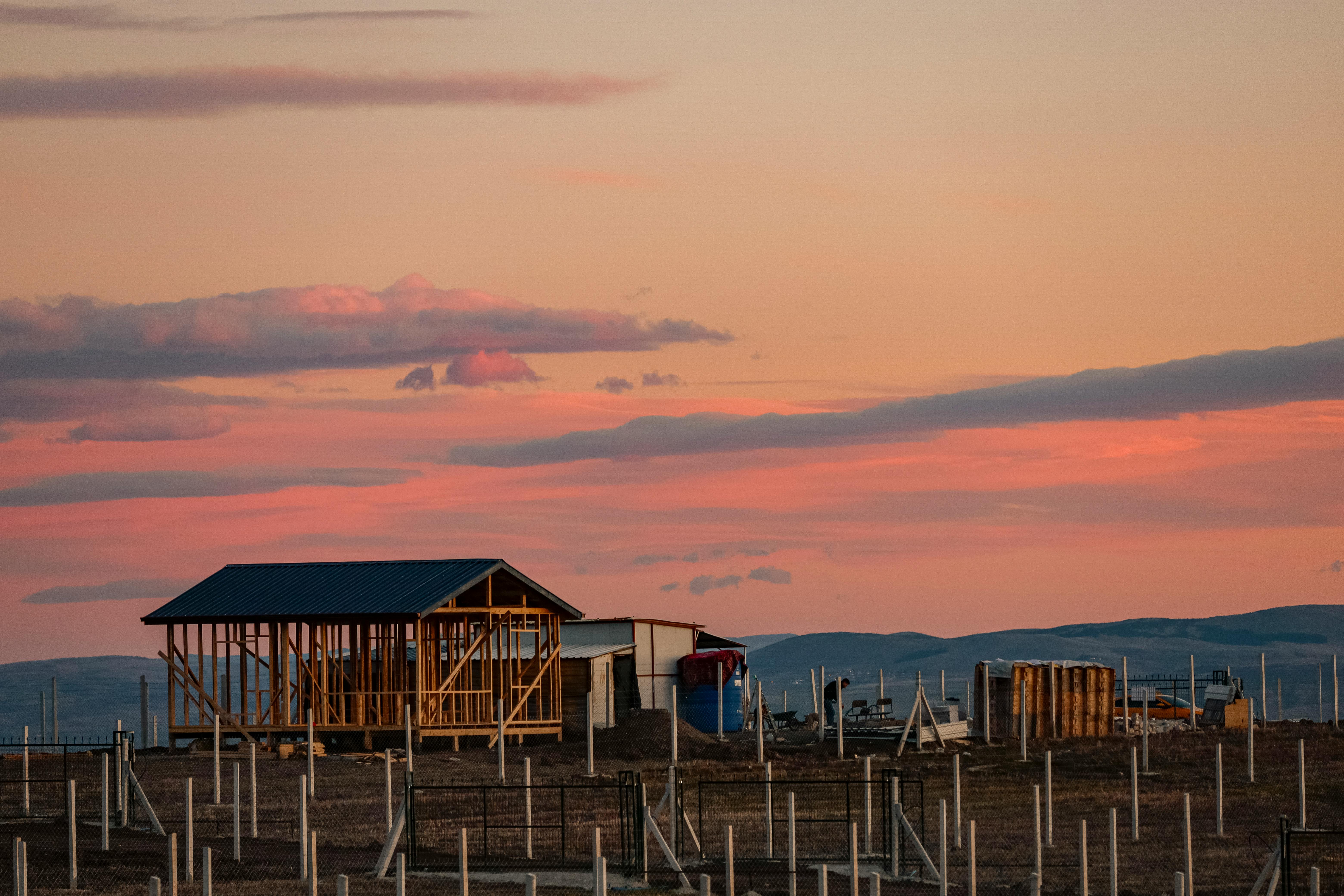 Farm in Mountains at Sunset · Free Stock Photo