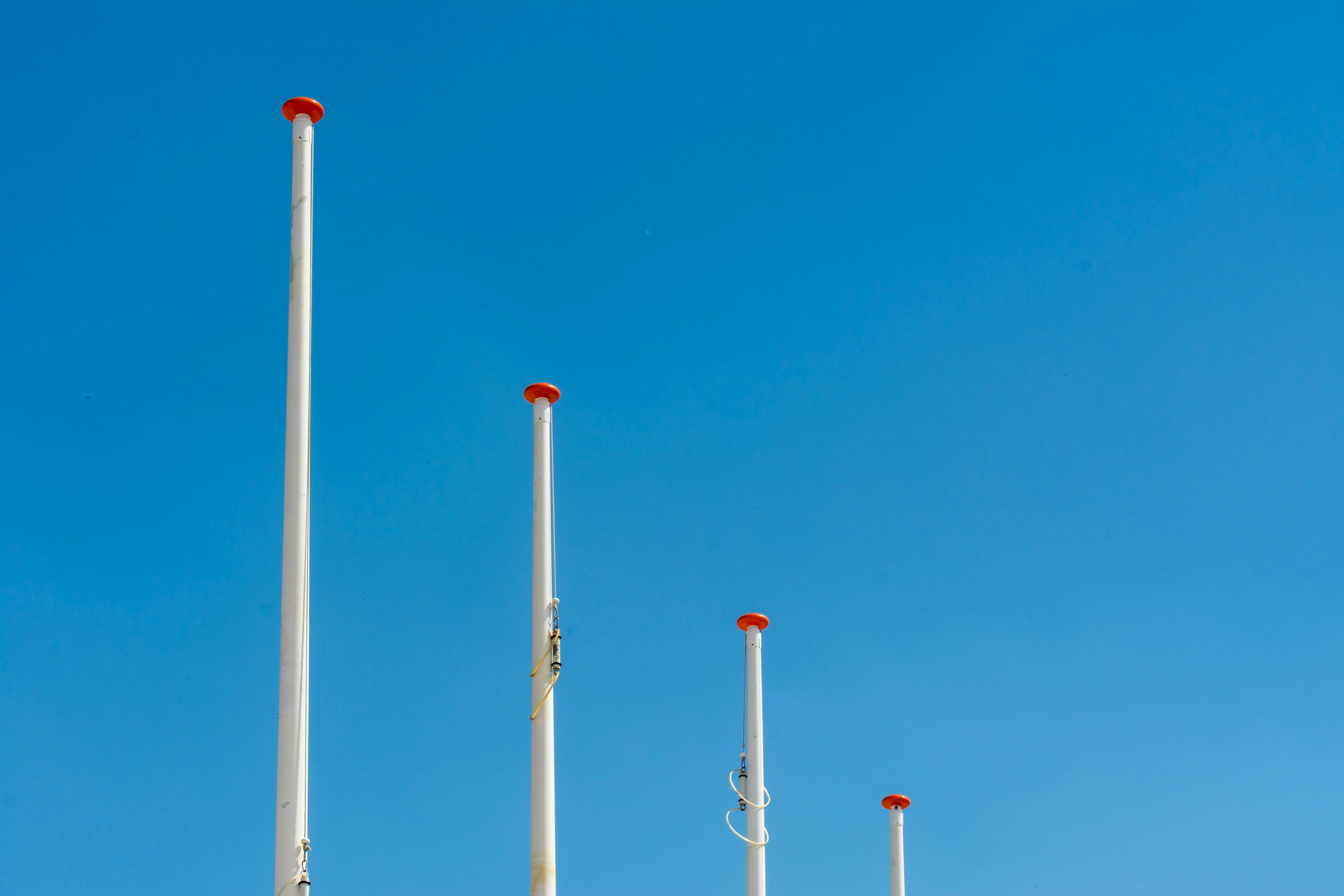White Poles with Red Tops · Free Stock Photo