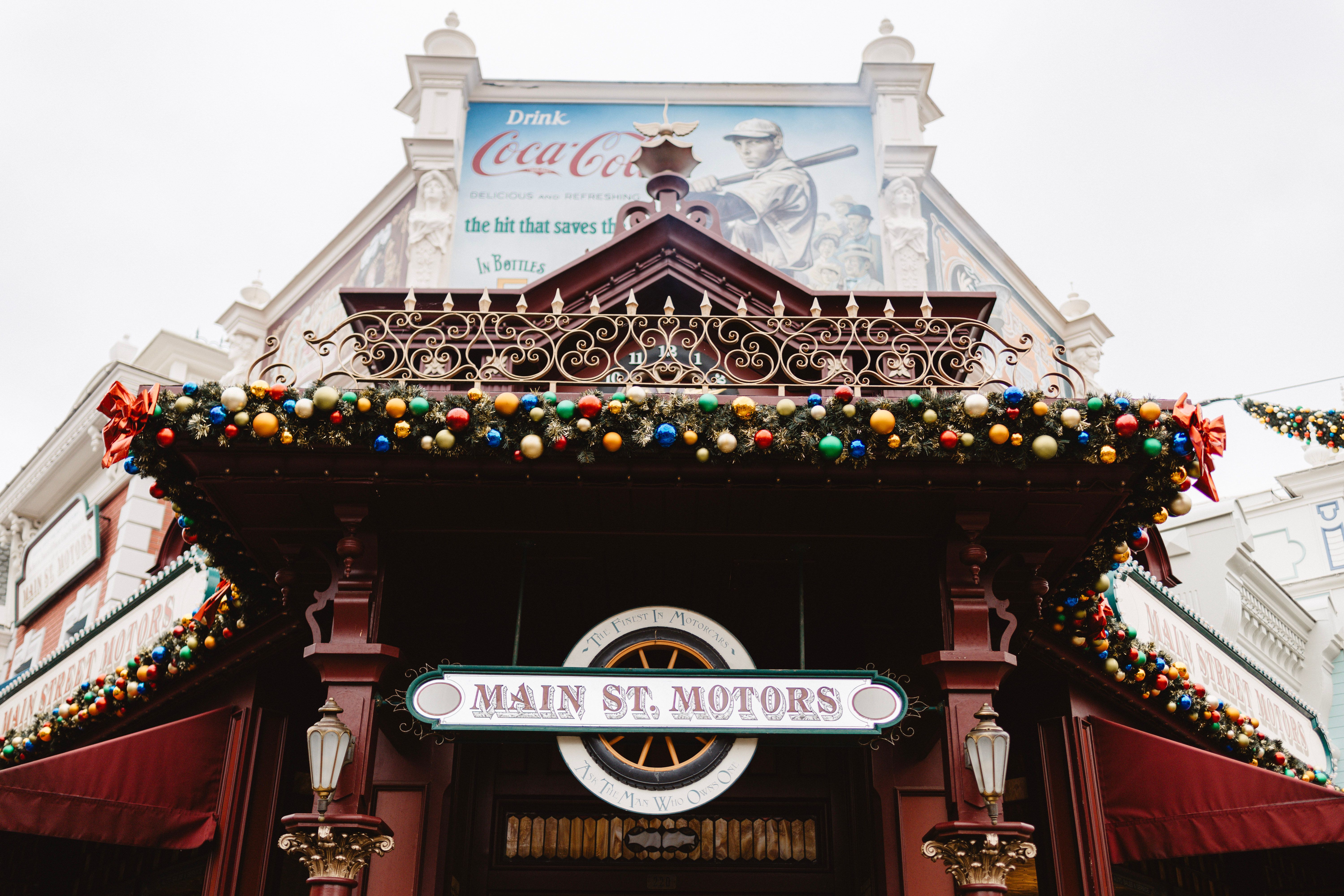 Entrance of Main Street Motors at Disneyland Paris · Free Stock Photo