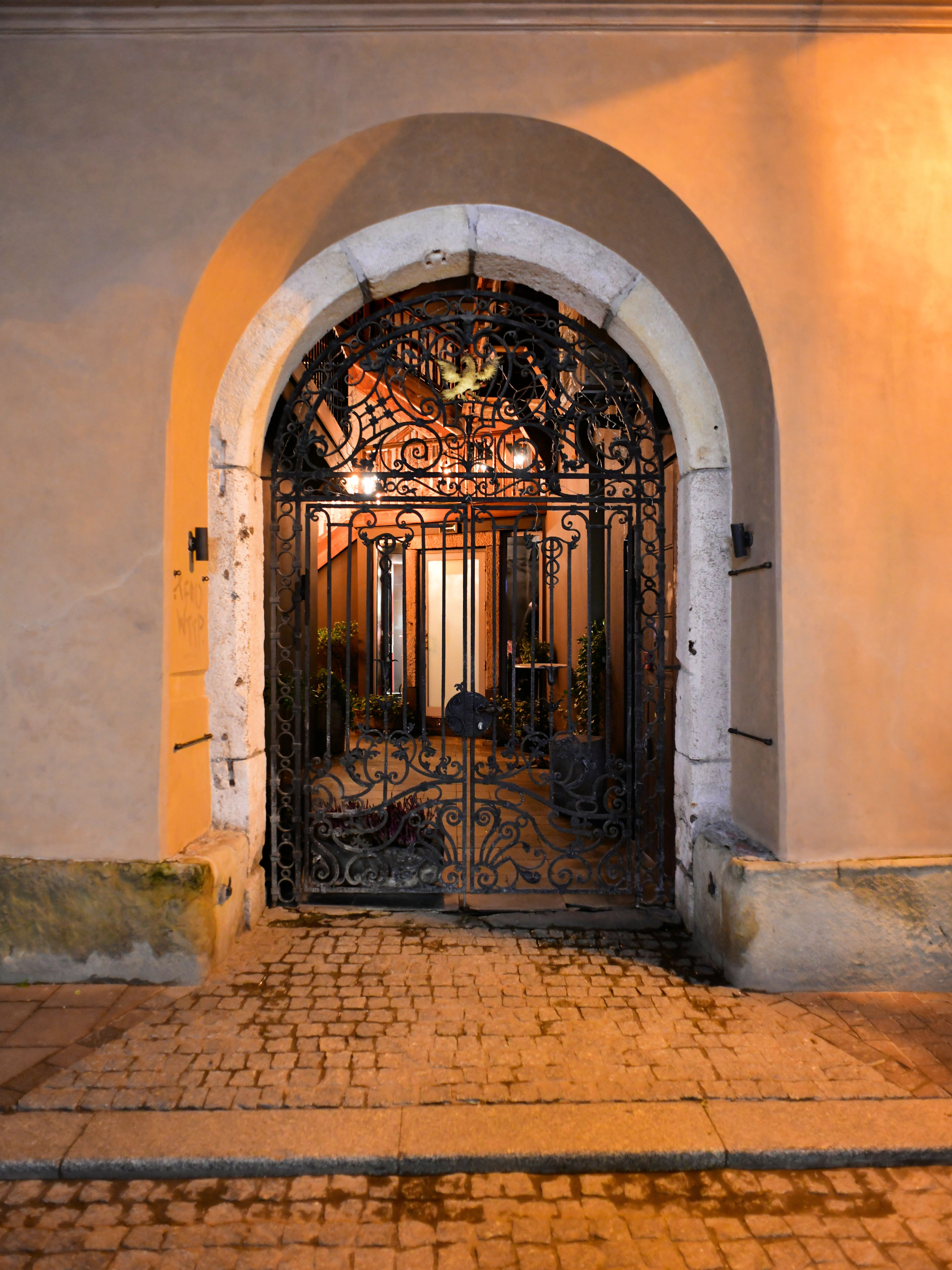 Metal Gate on Brick Wall · Free Stock Photo