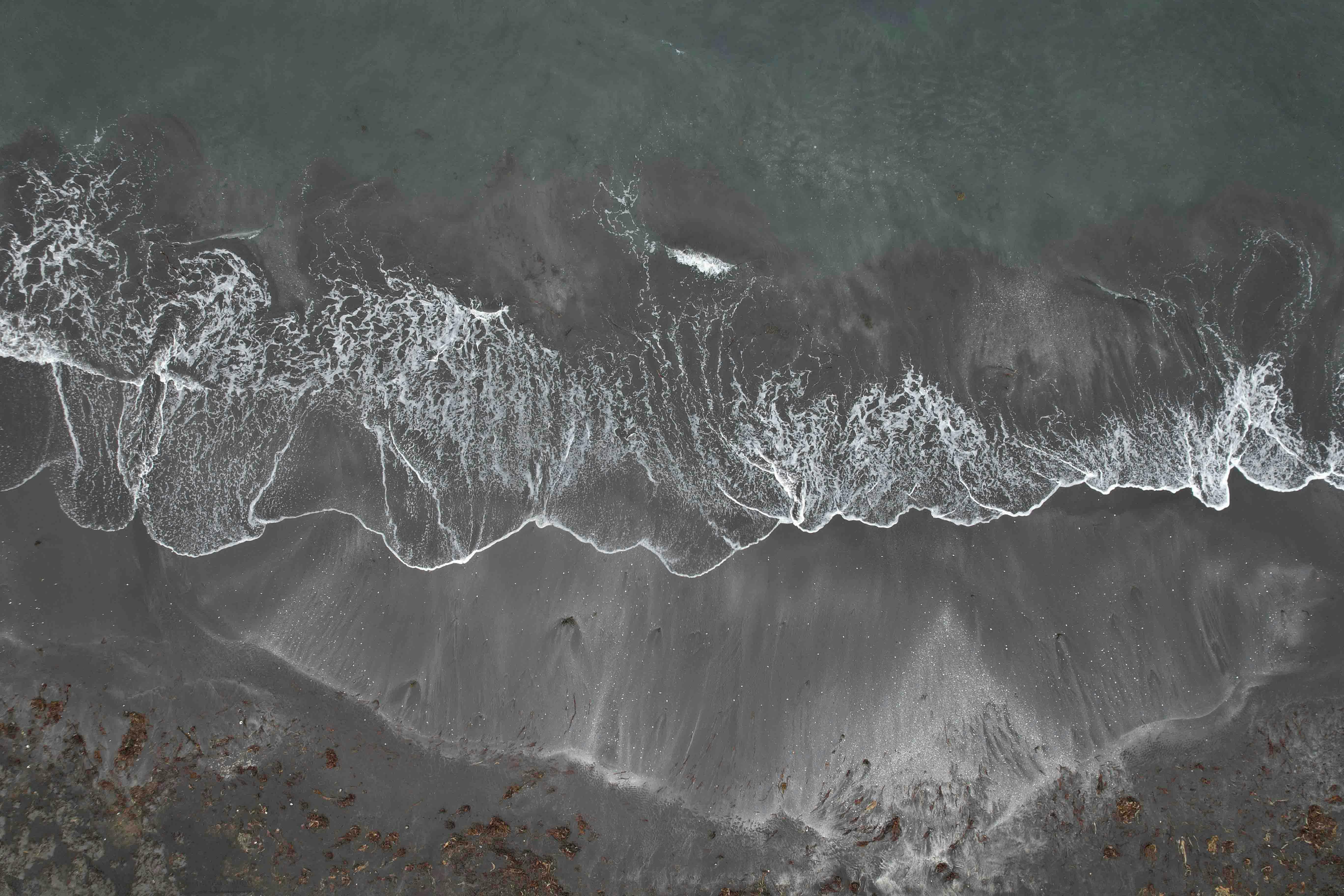 Aerial Photo of a Surf Line on a Beach · Free Stock Photo