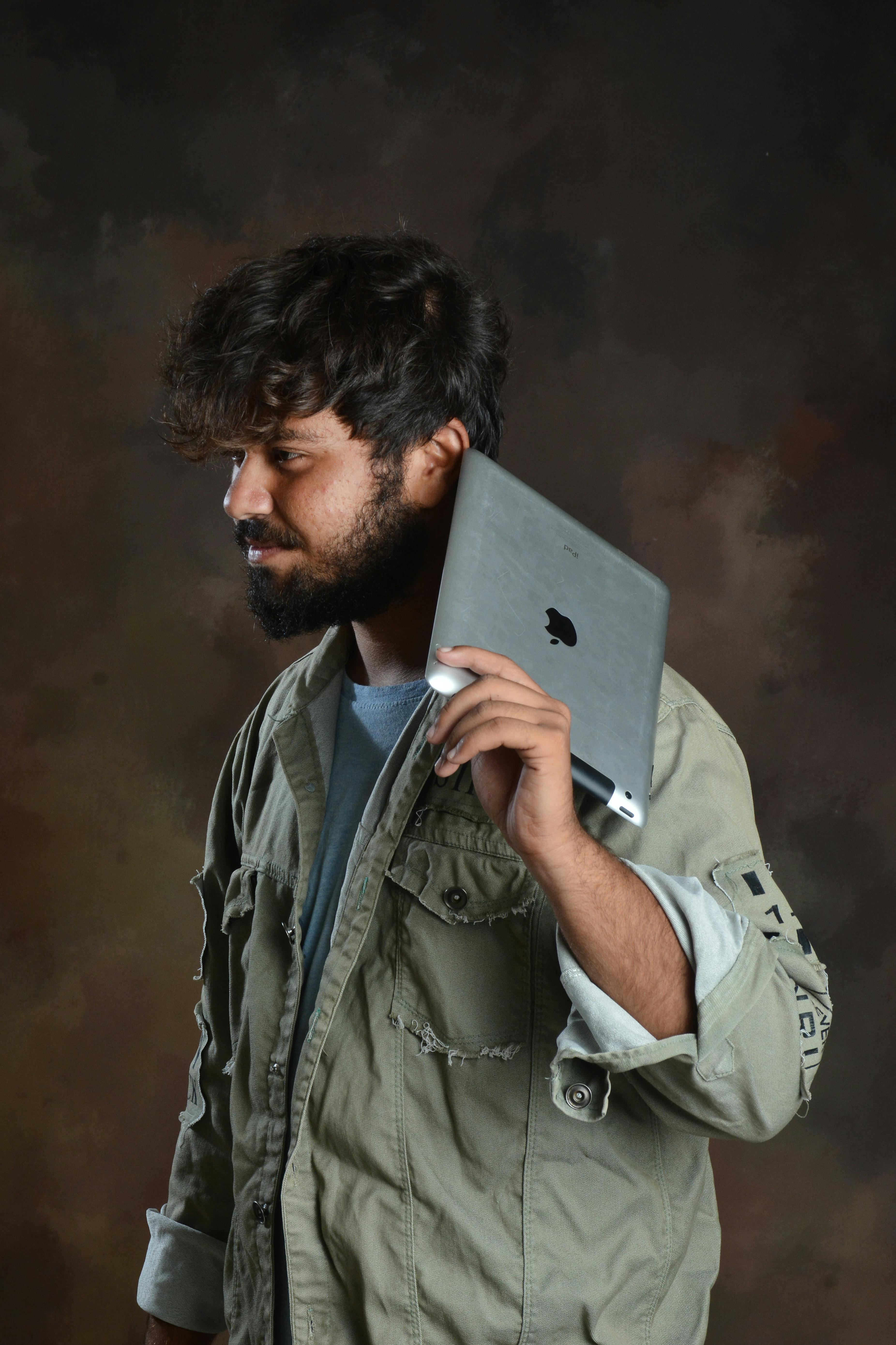 Portrait of Man with iPad · Free Stock Photo