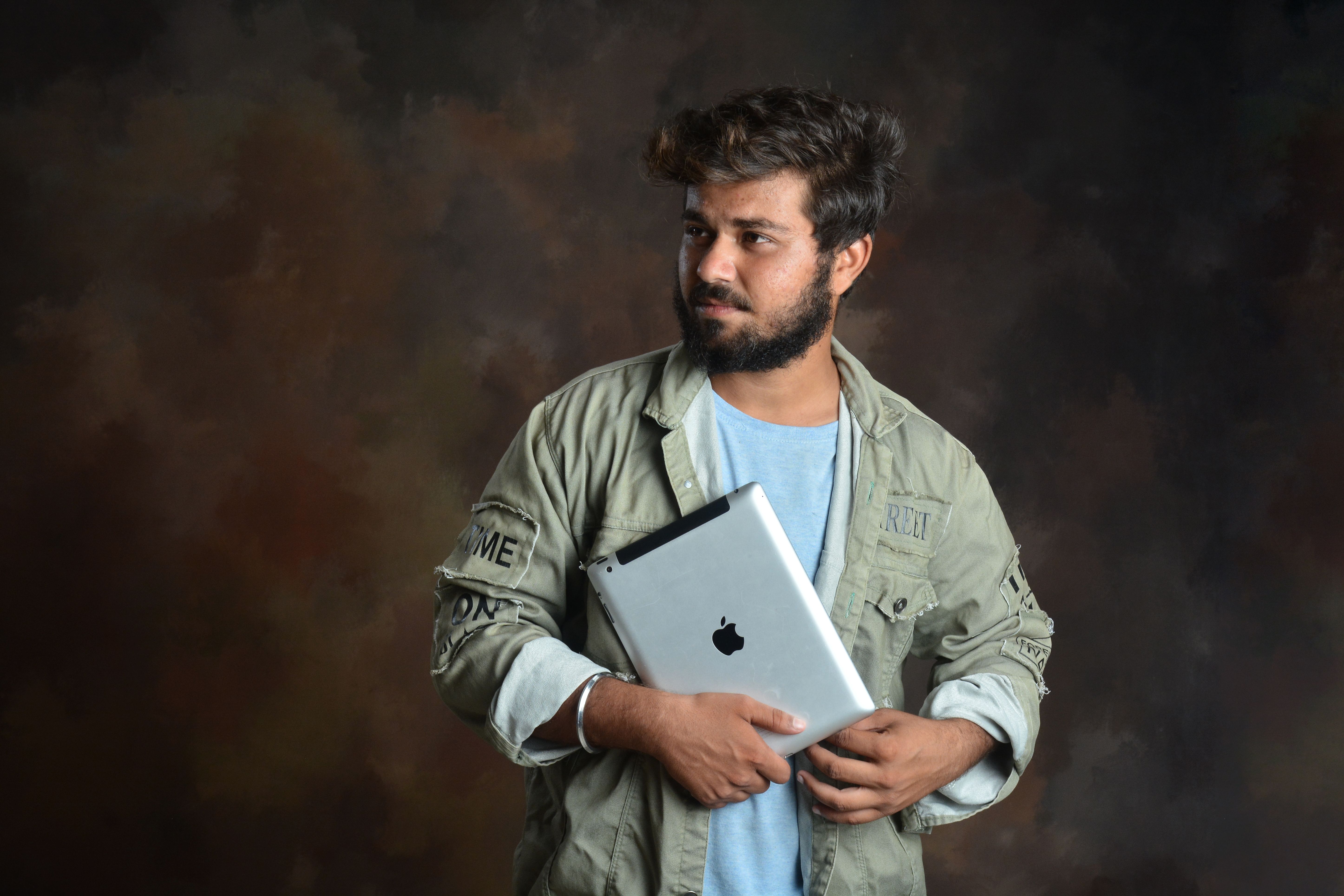 Portrait of Man with iPad · Free Stock Photo