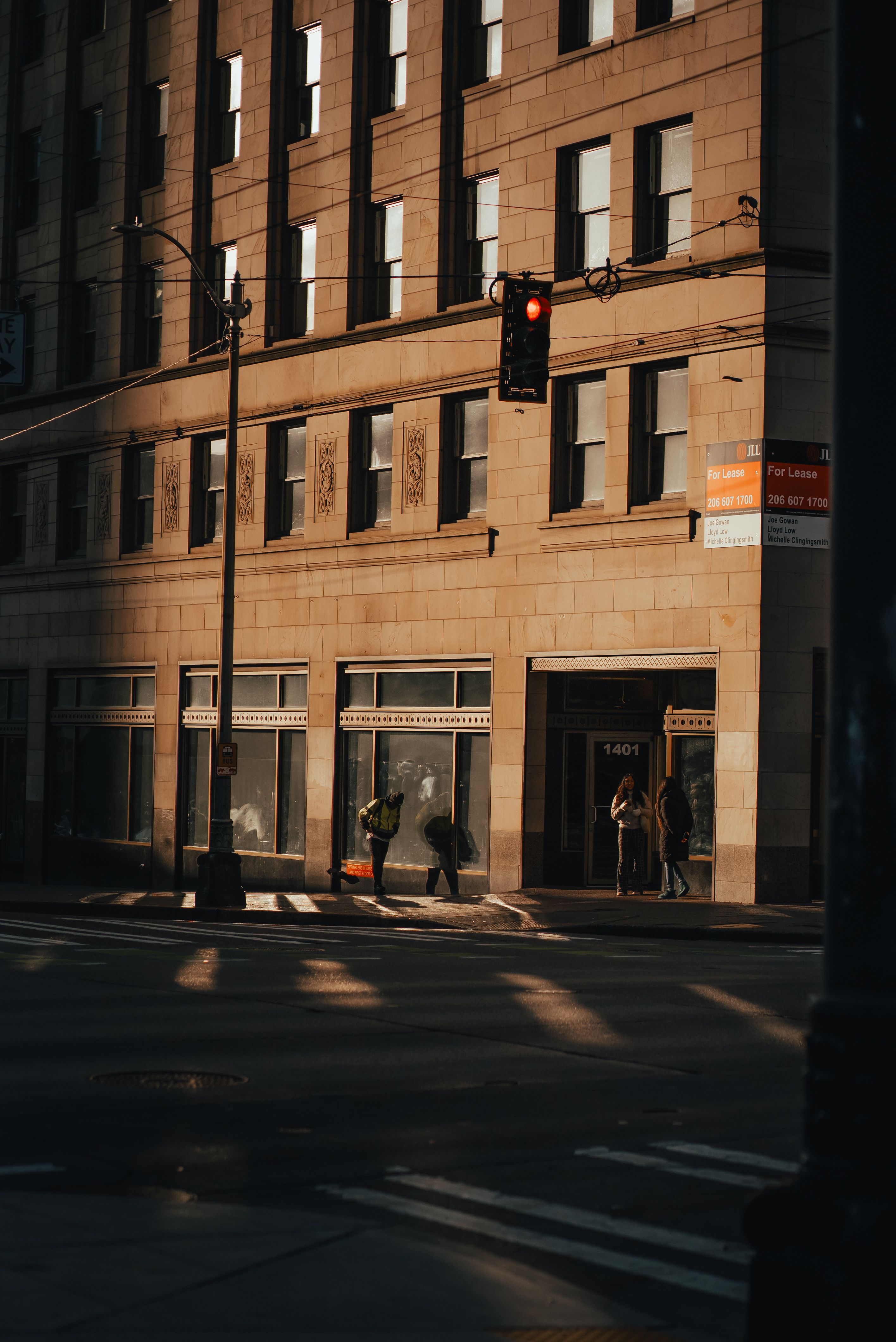 Man Walking Beside Building · Free Stock Photo