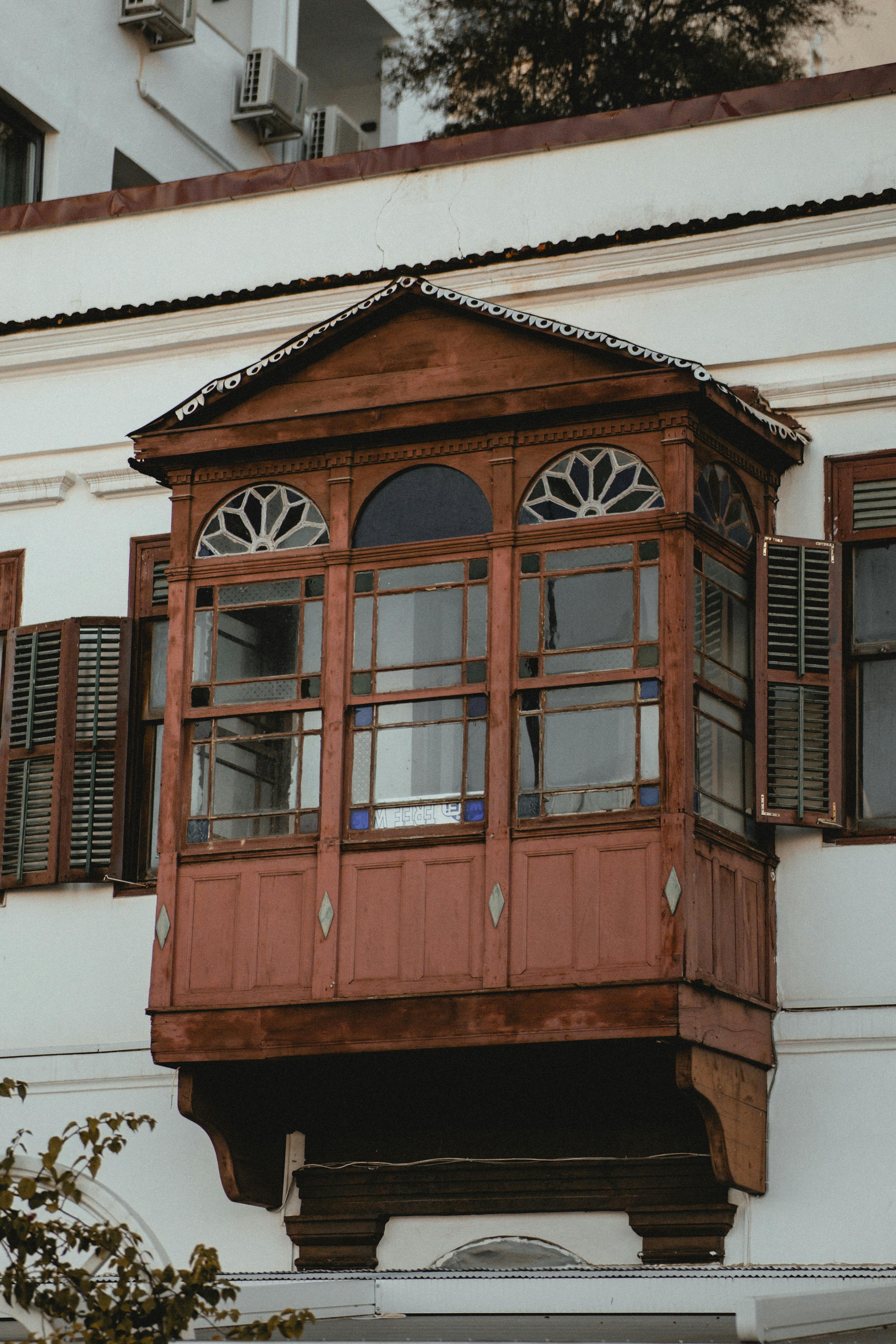 Old Wooden Bay Window with Stained Glass · Free Stock Photo