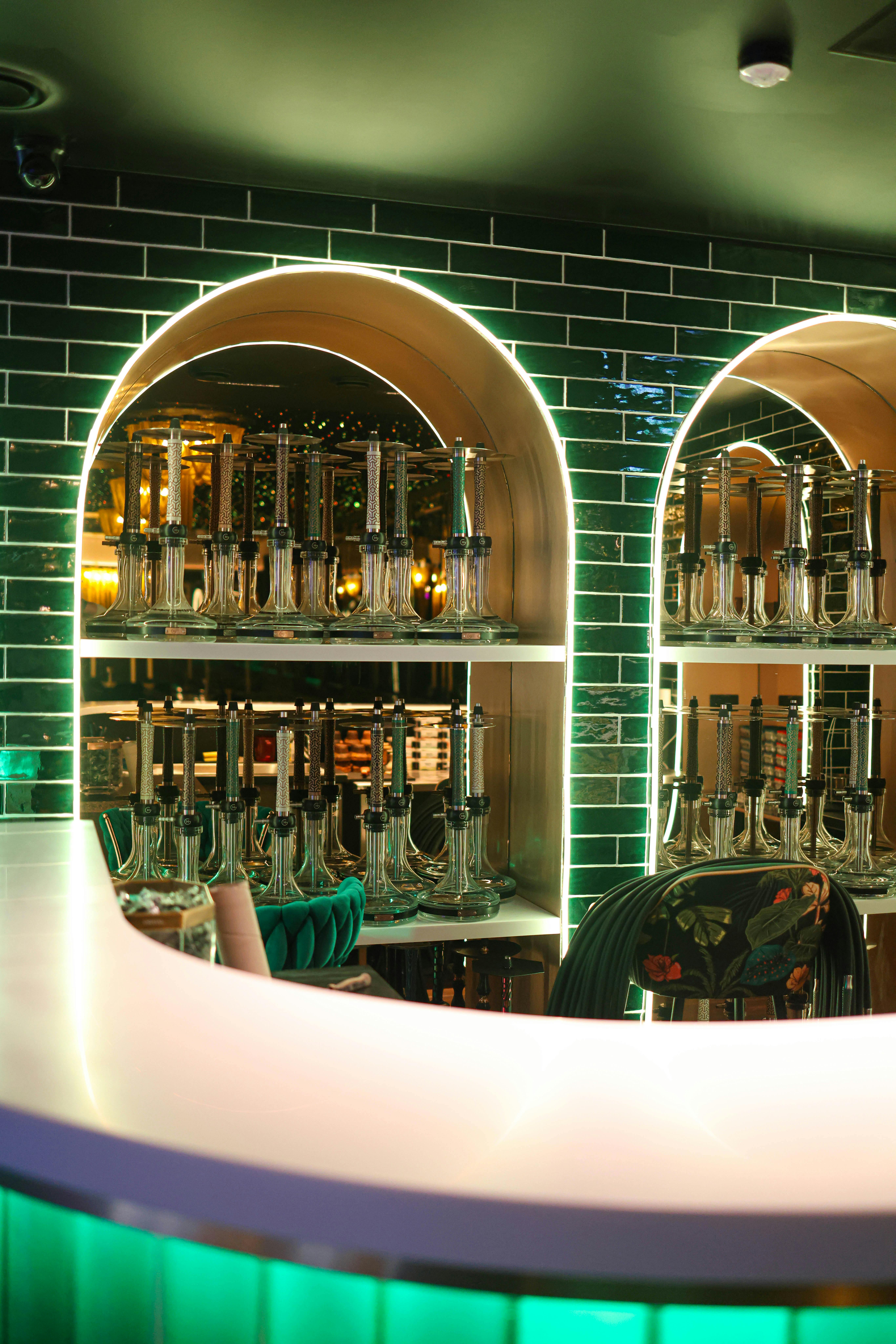 Illuminated Green Bar Interior · Free Stock Photo