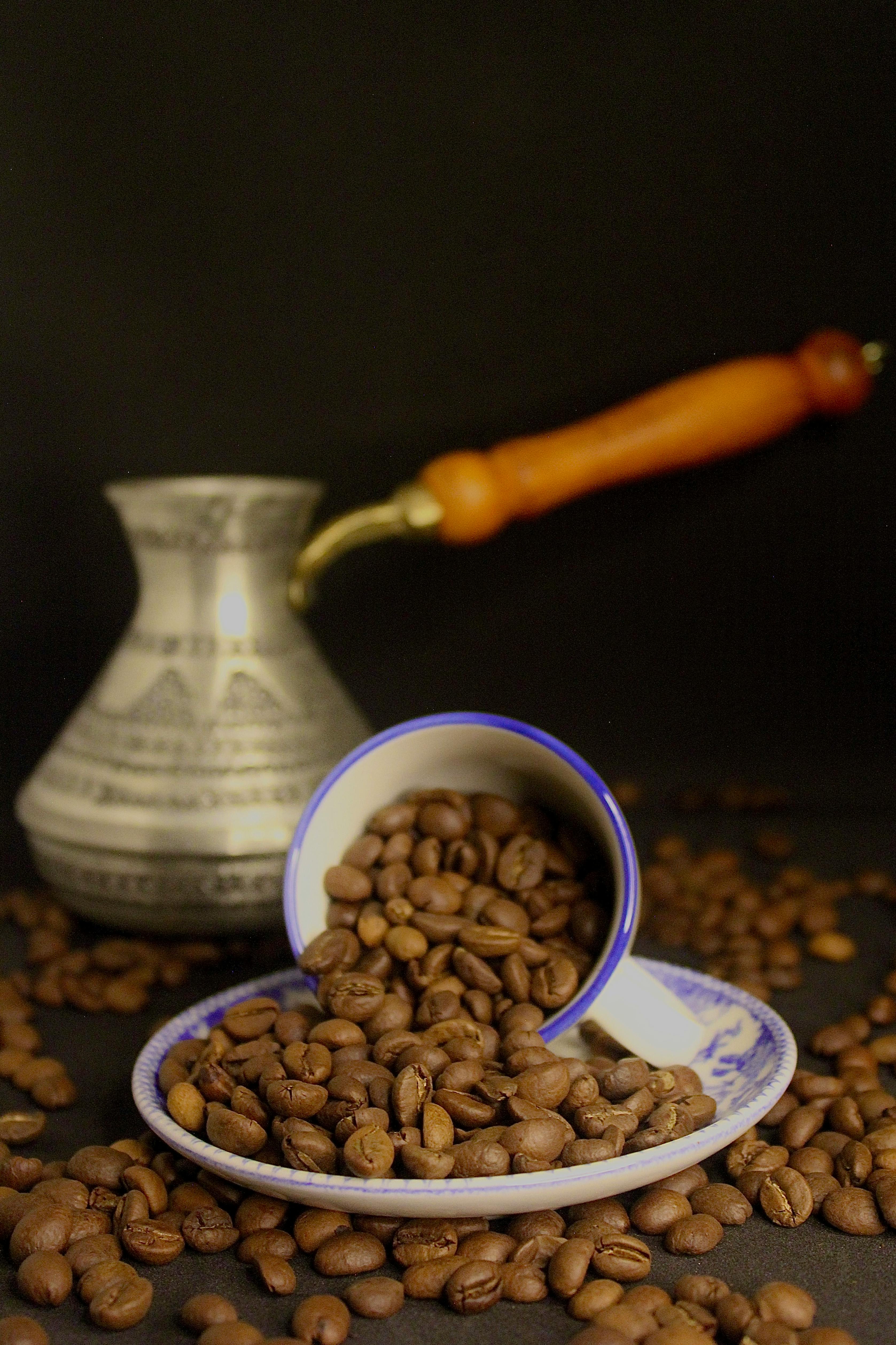 Coffee Beans Scattered by Traditional Long Handled Pot · Free Stock Photo