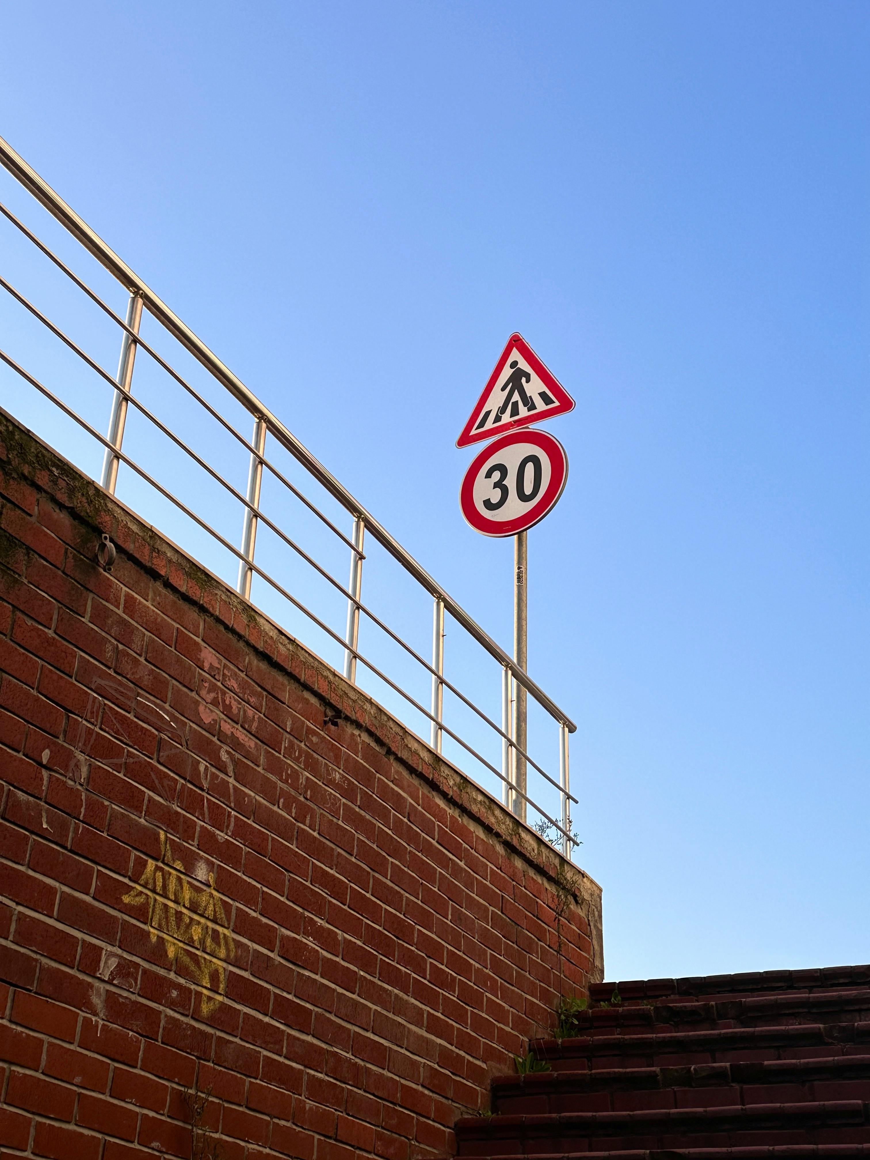 Crosswalk Sign and Speed Limit Sing · Free Stock Photo