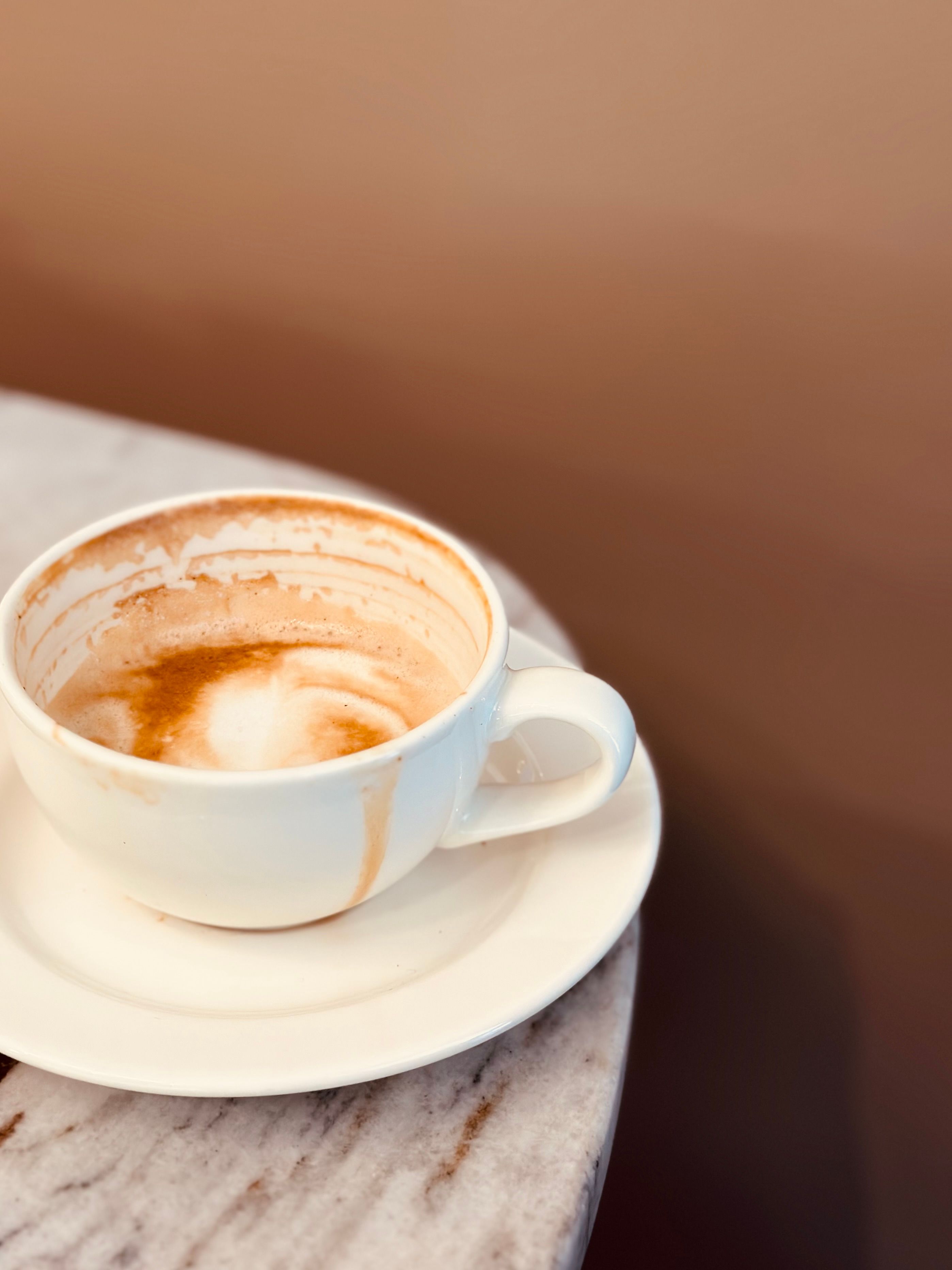Woman Drinking Coffee with Milk · Free Stock Photo