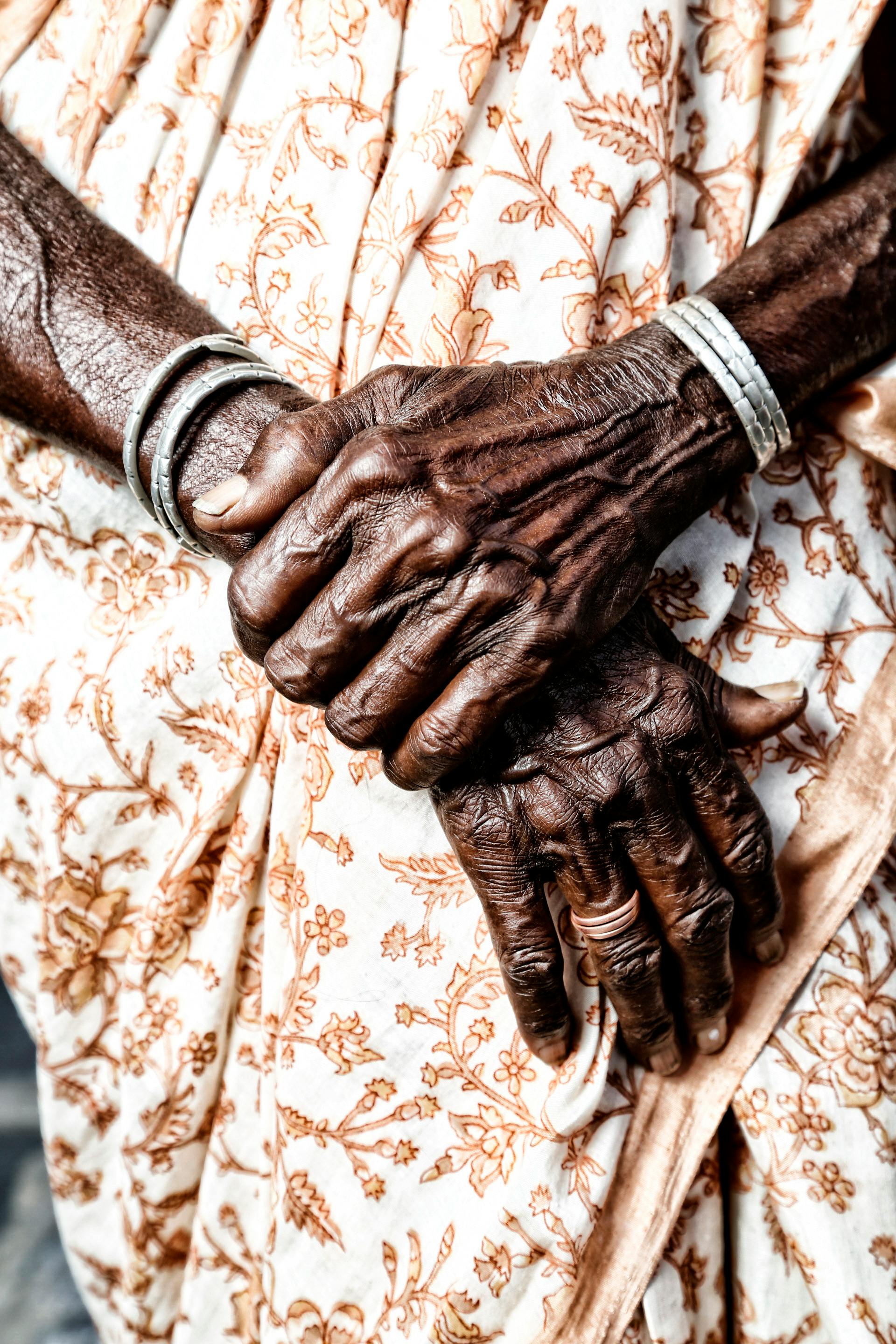 Hands of Elderly Slim Person · Free Stock Photo