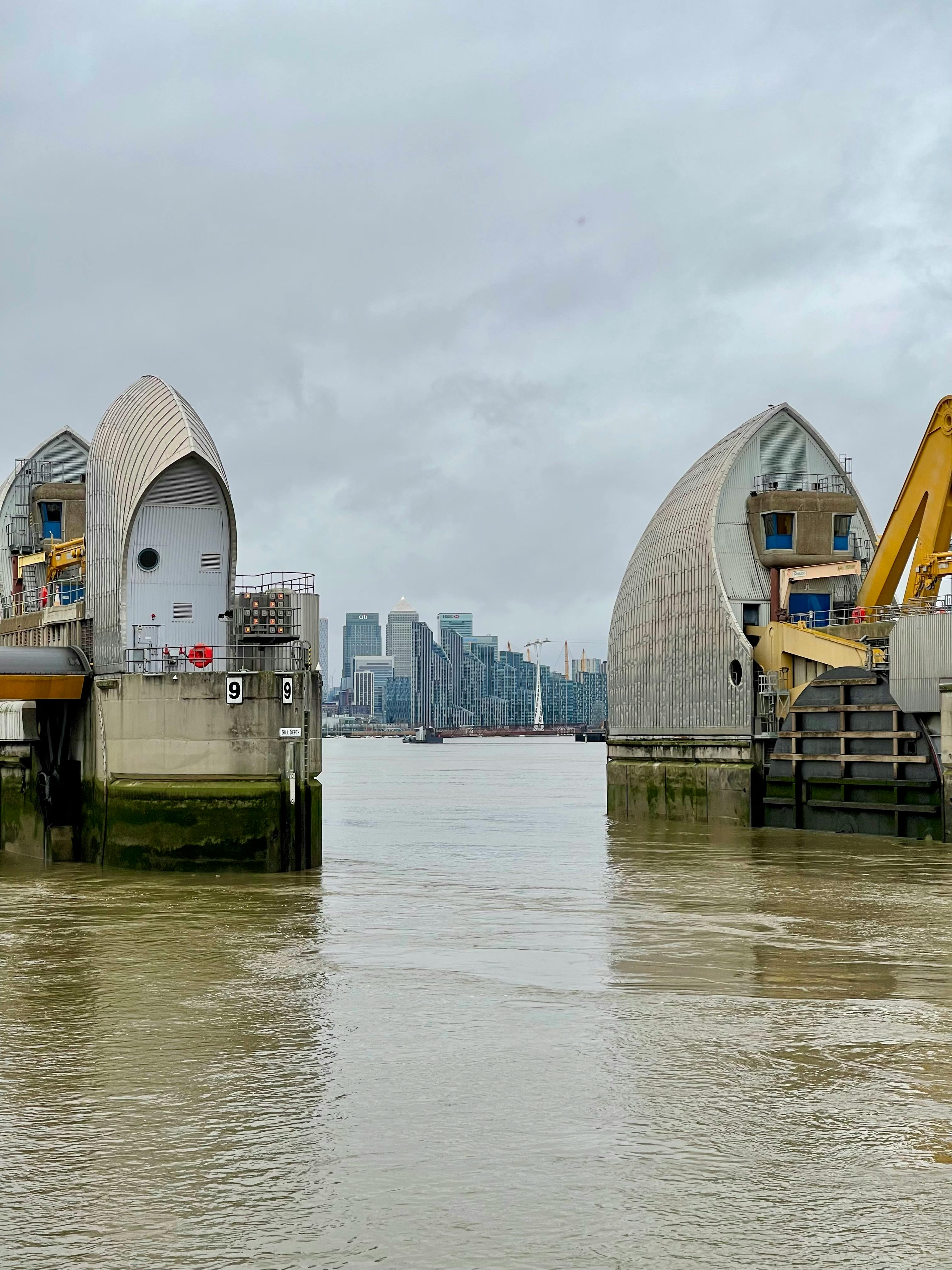 Structure of the Thames River Barrier and Modern Architecture Skyline ...