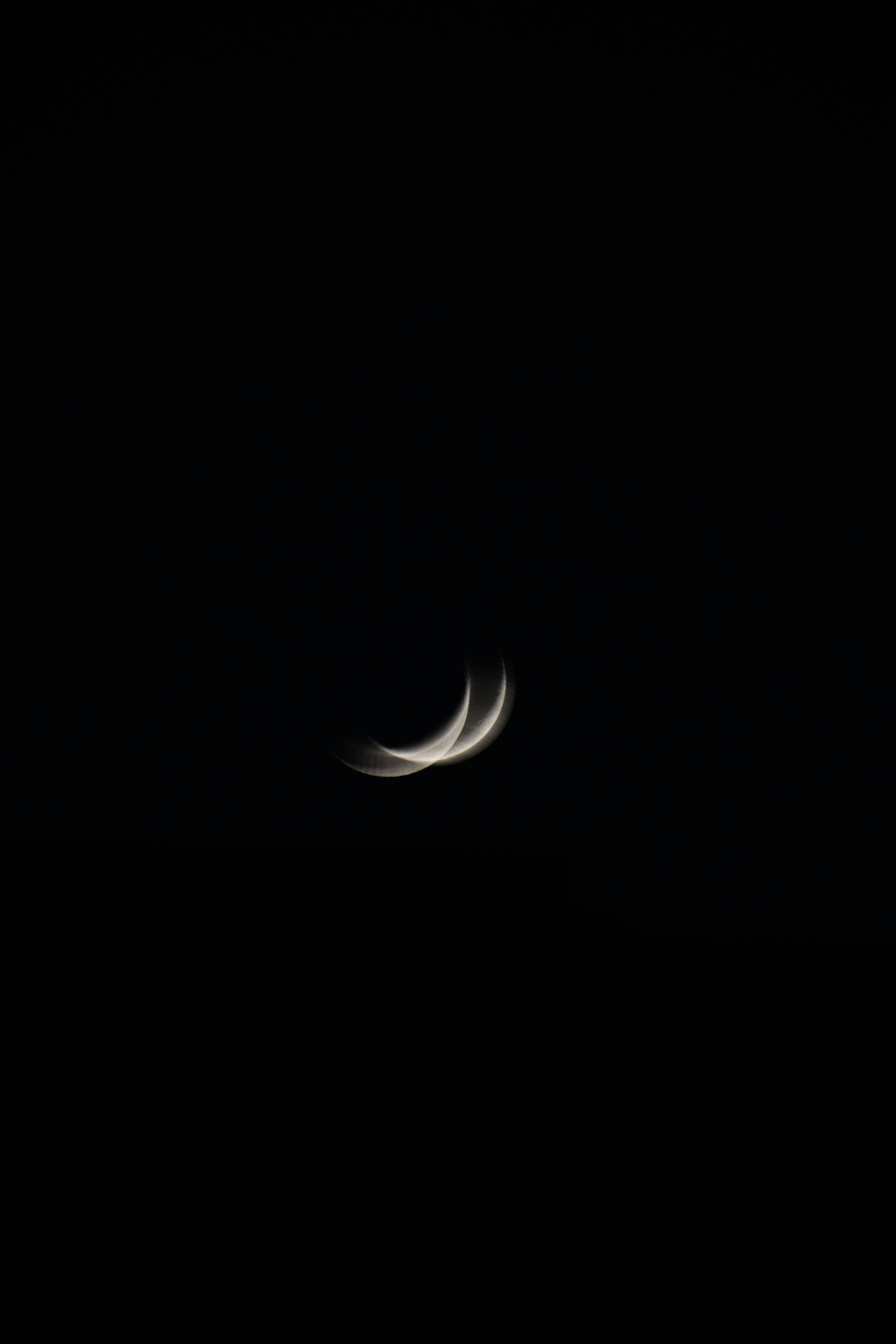 Blurred Crescent Moon in Night Sky · Free Stock Photo