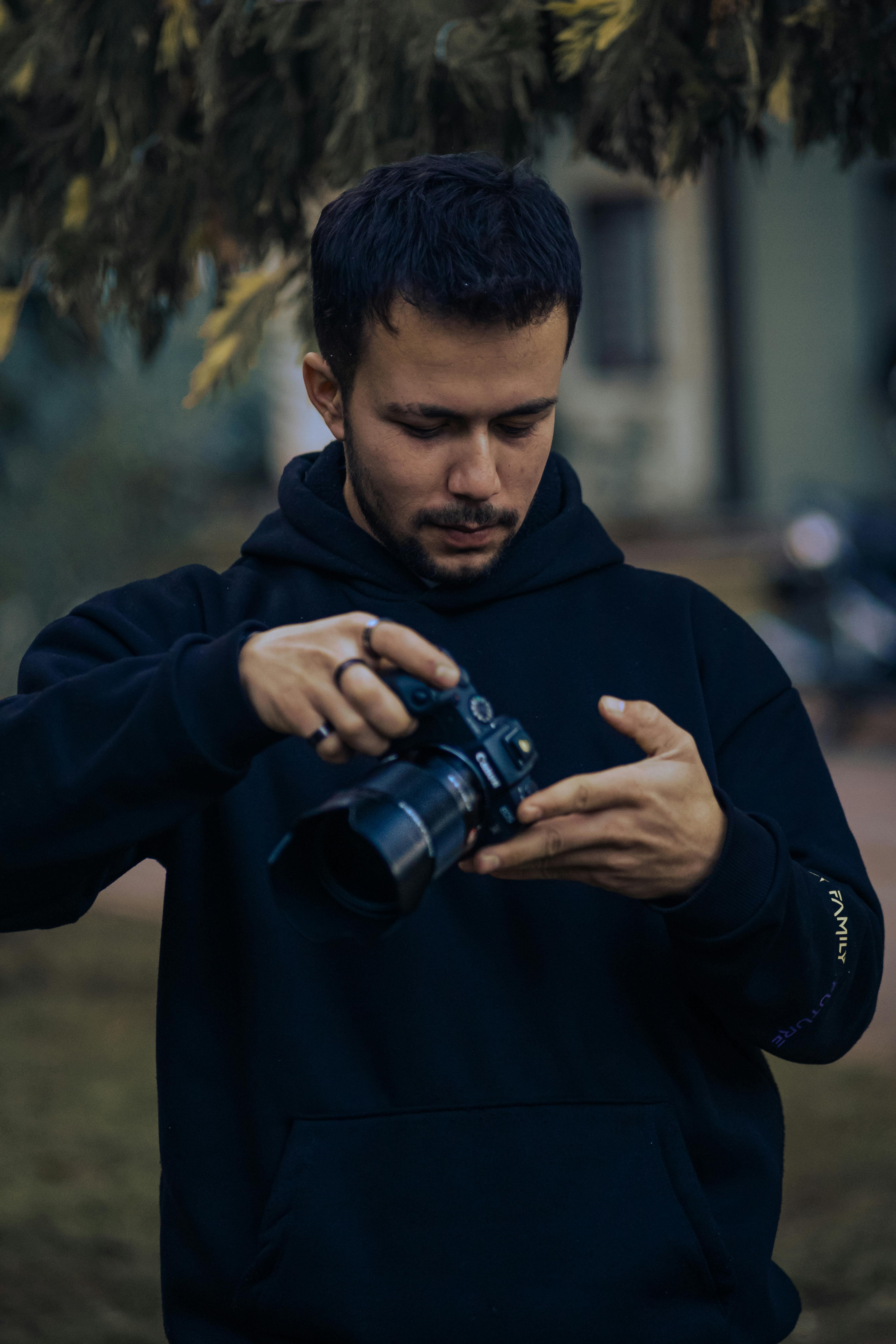 Man Standing with Camera · Free Stock Photo