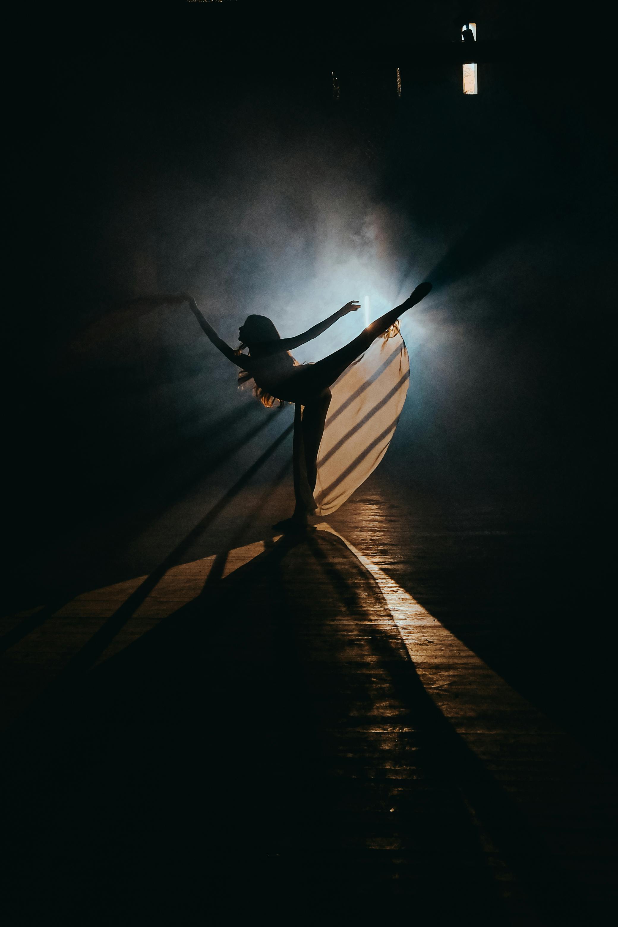 Woman Dancing in a Shadow · Free Stock Photo