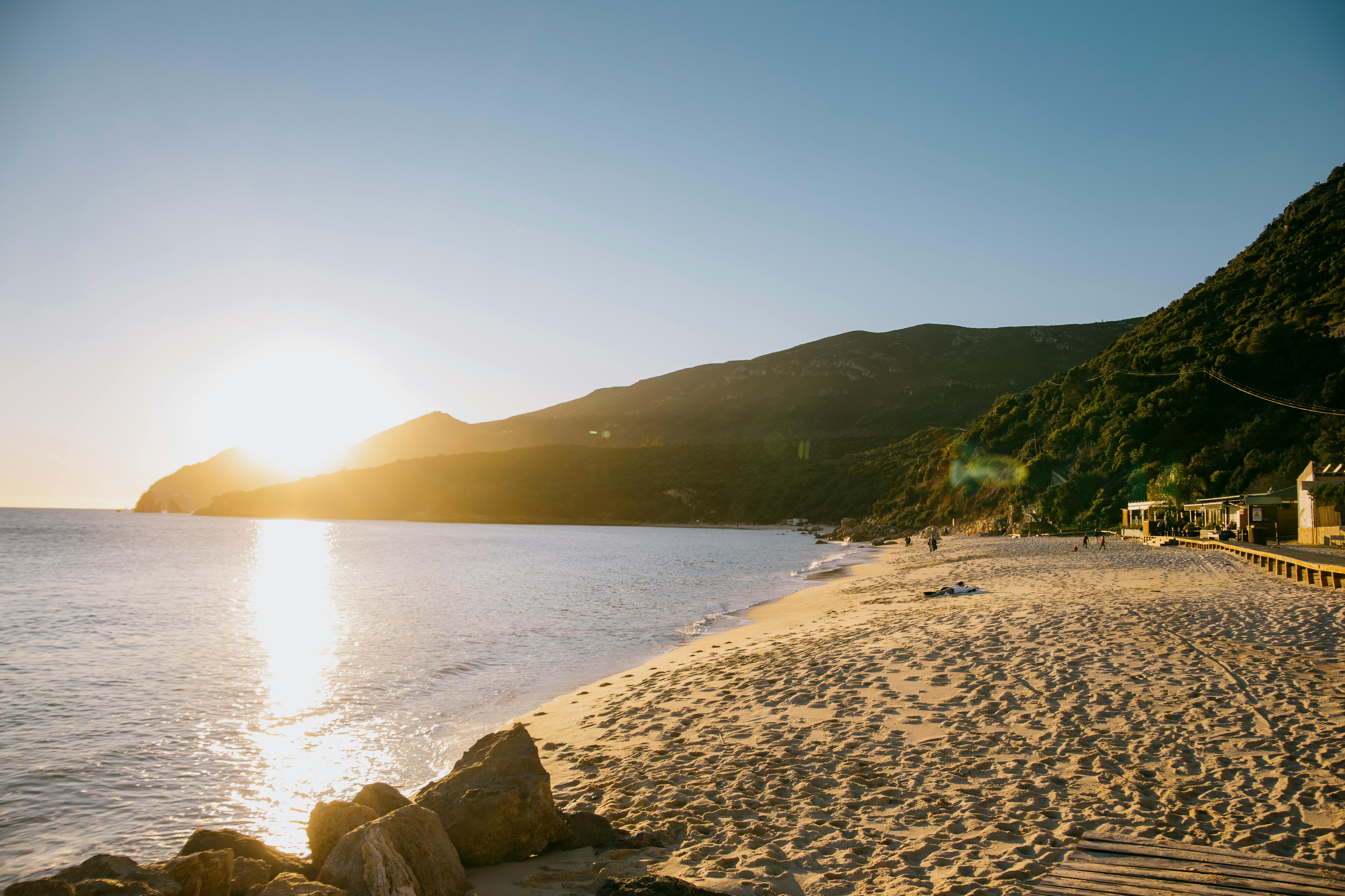 Sunset Sunlight over Beach on Sea Shore · Free Stock Photo