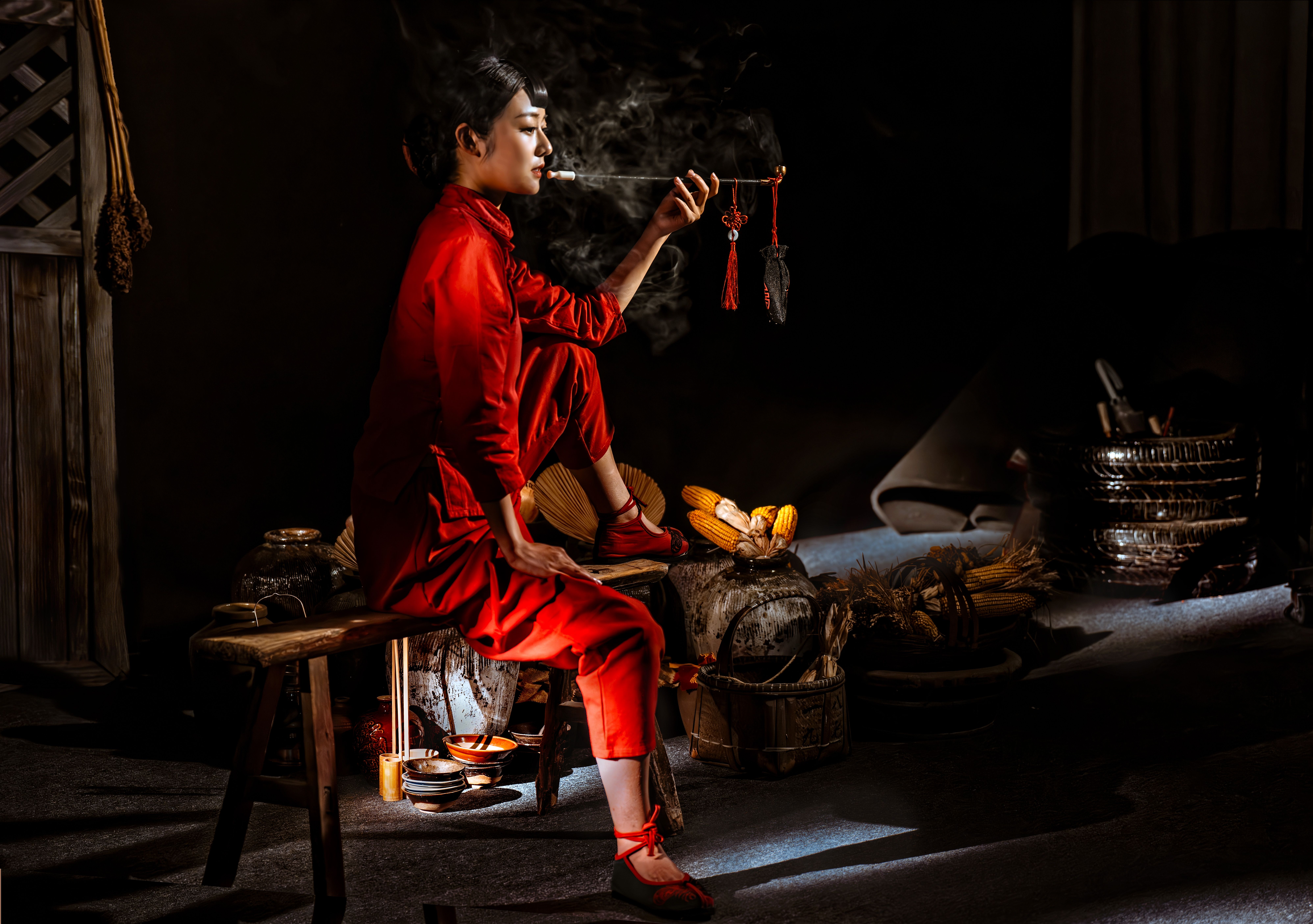Woman in Traditional Clothing Smoking Pipe · Free Stock Photo