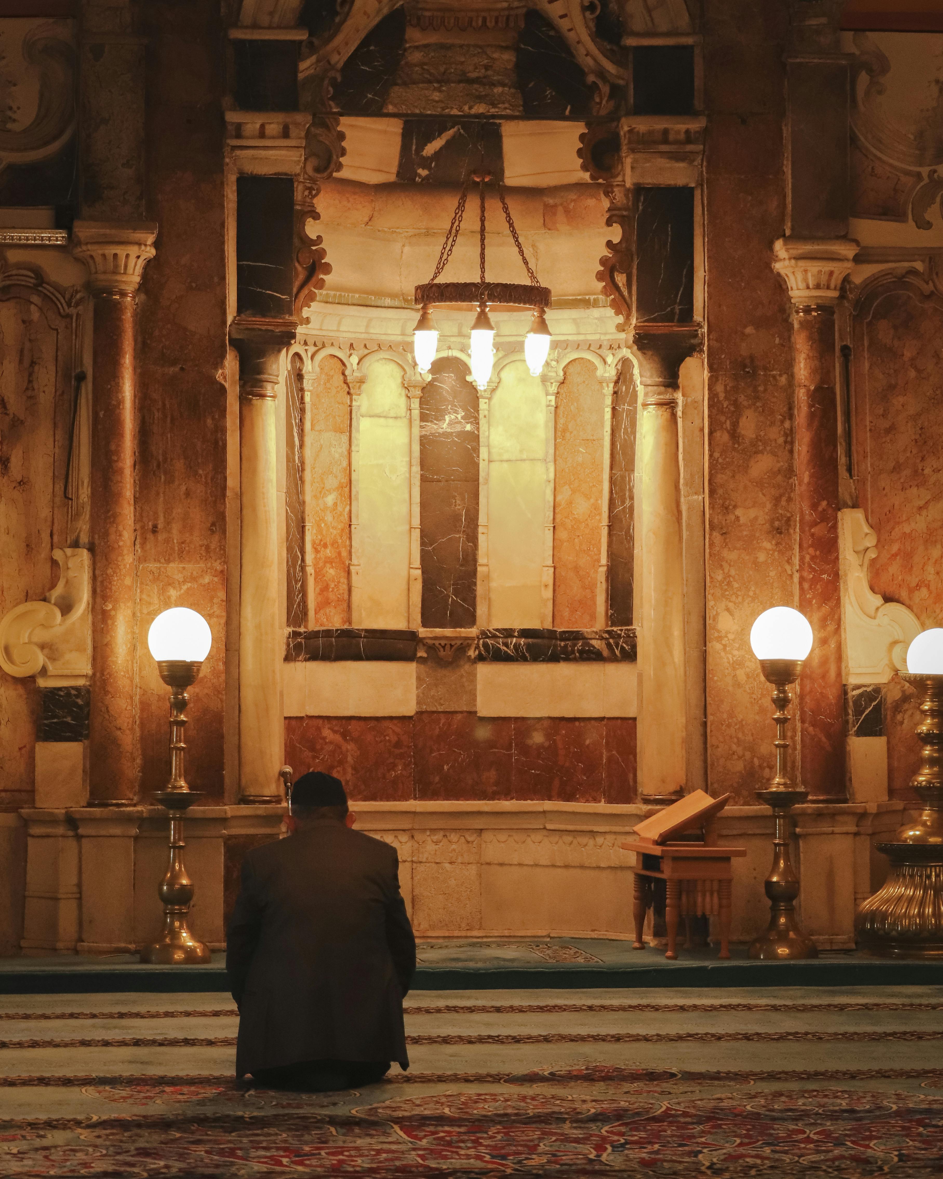 Man Praying in Mosque · Free Stock Photo