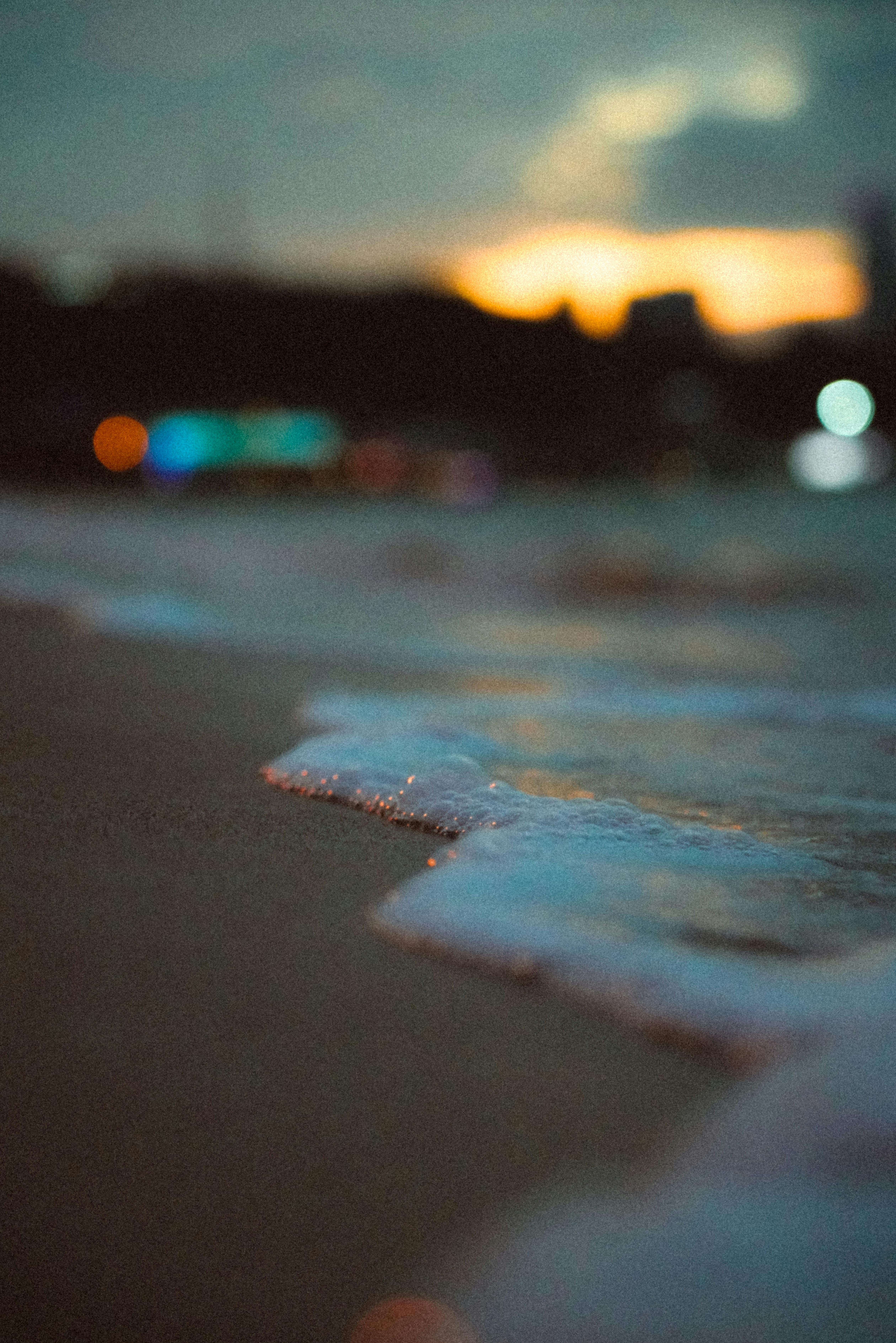 Shallow Water on Sea Shore at Sunset · Free Stock Photo