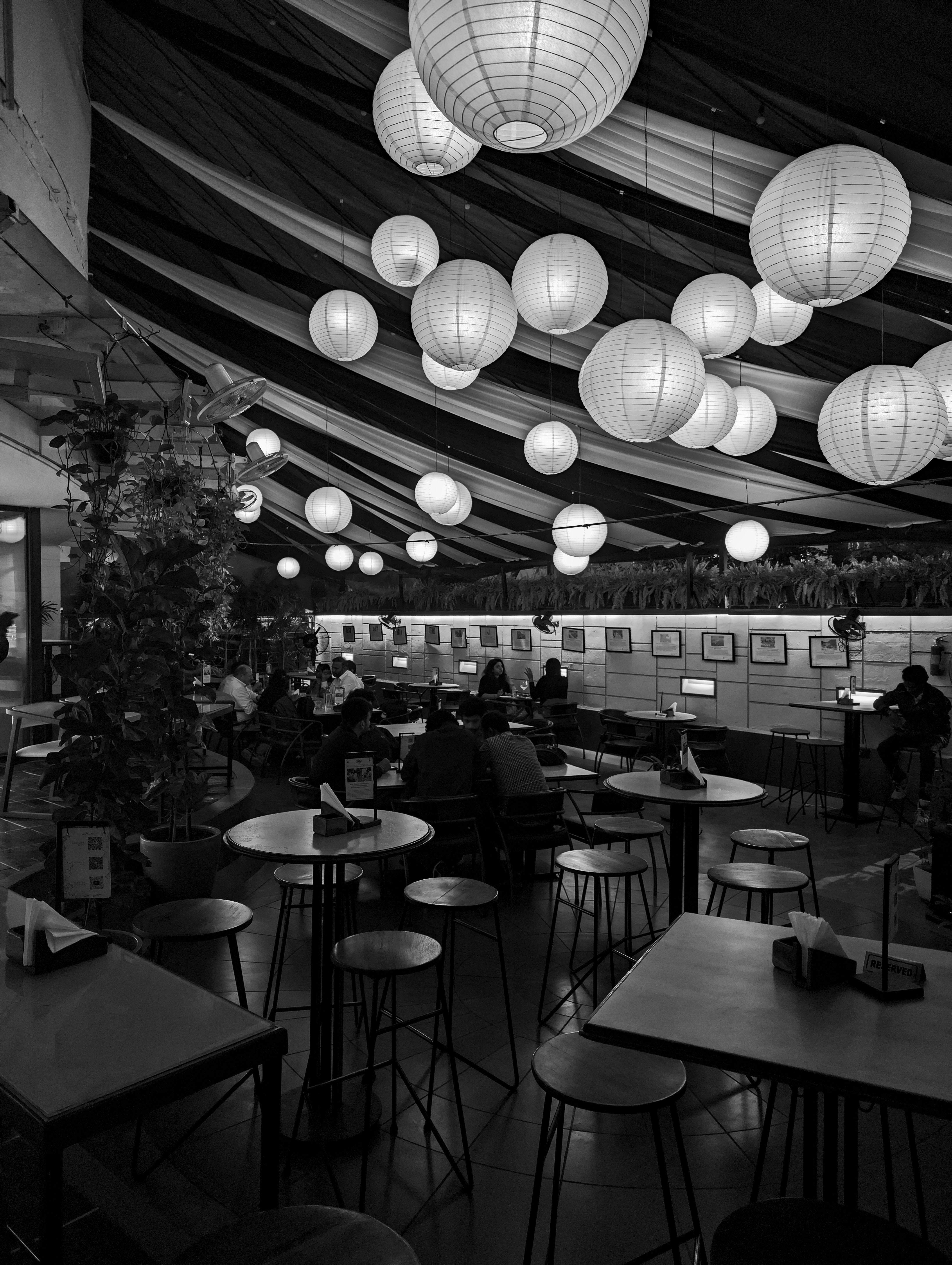 Black and White Photography of a Restaurant Interior with Lanterns ...