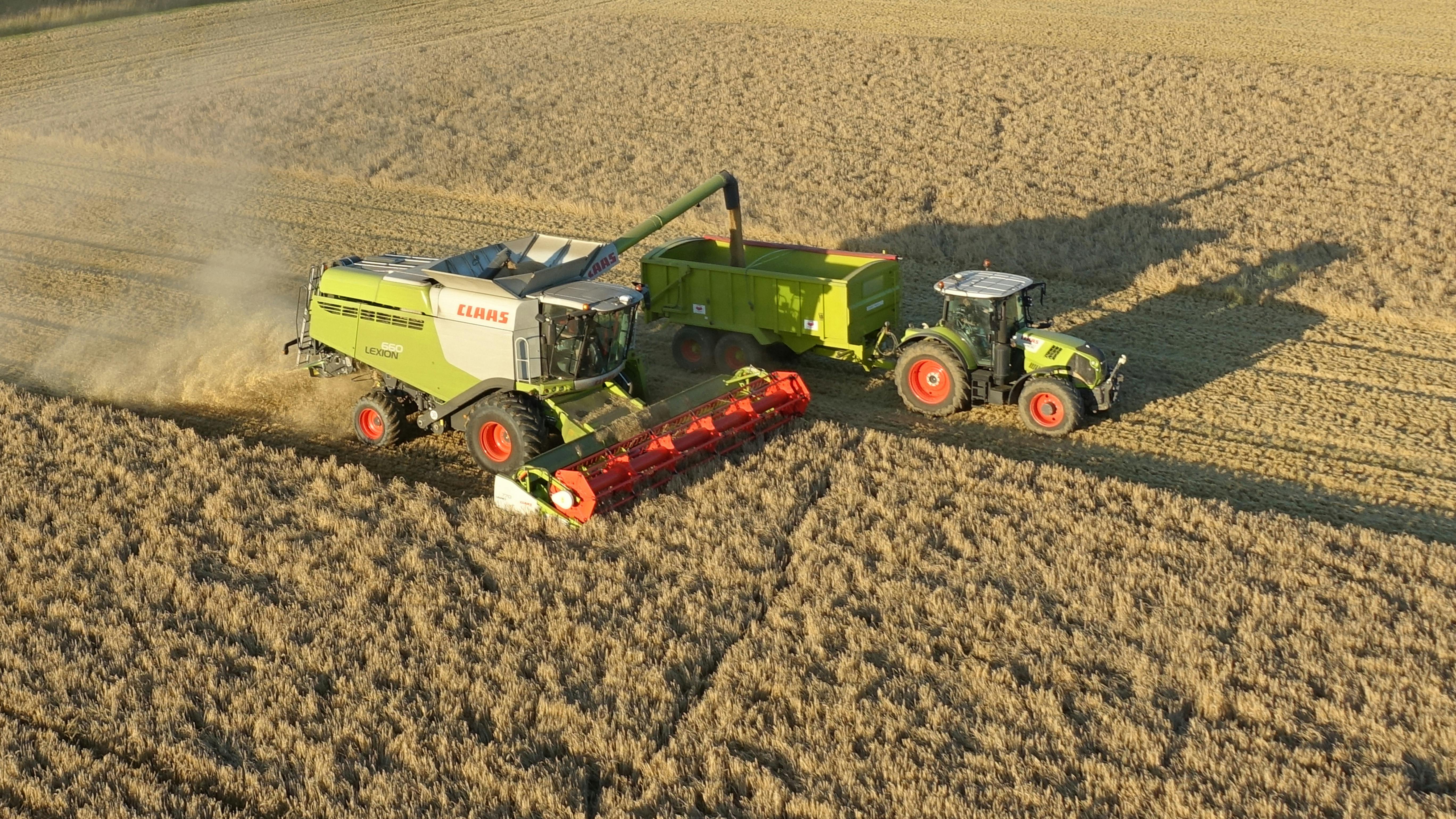 class combine harvester from the air · Free Stock Photo