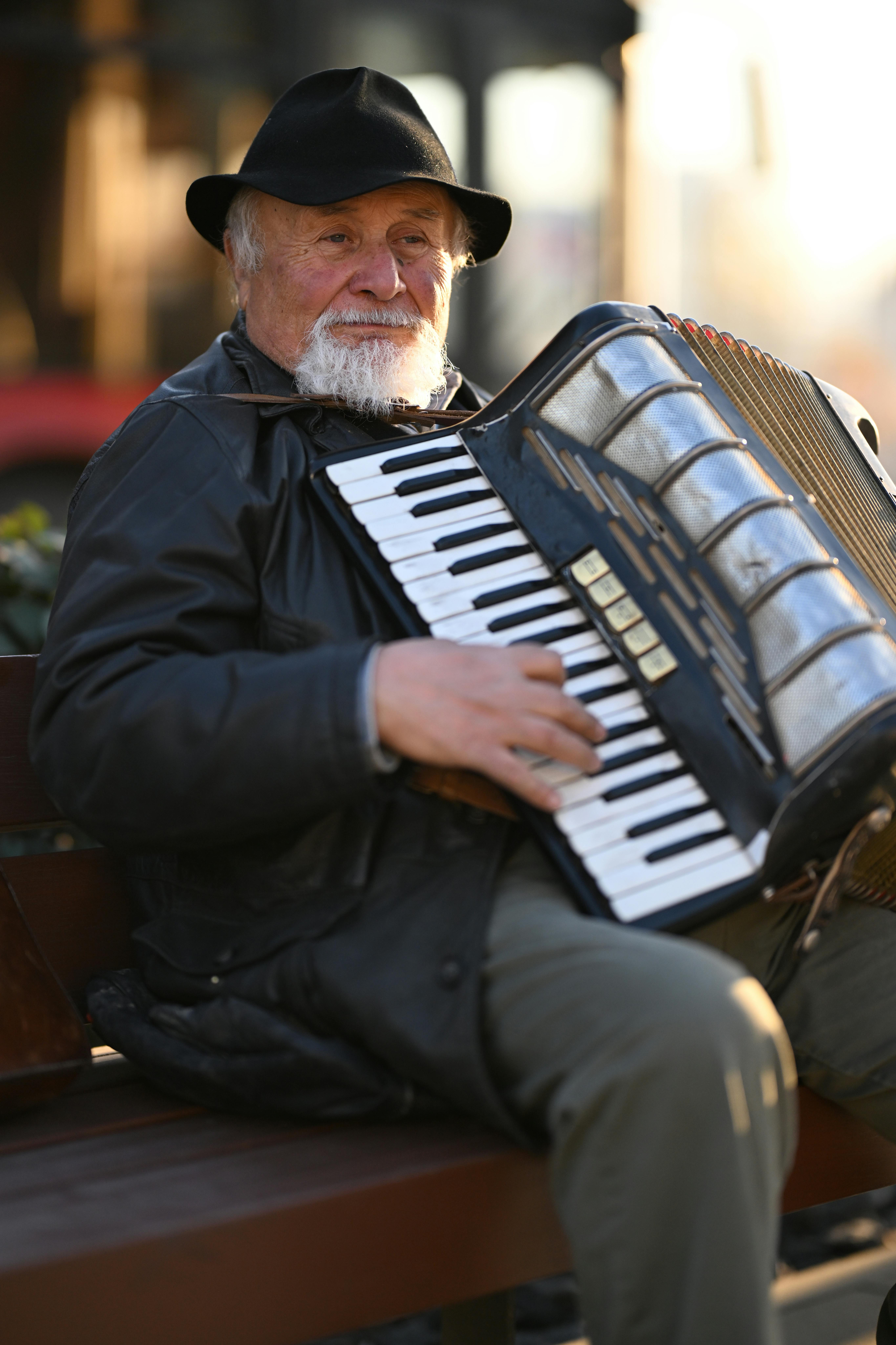 Man Playing Music on Acardeon · Free Stock Photo
