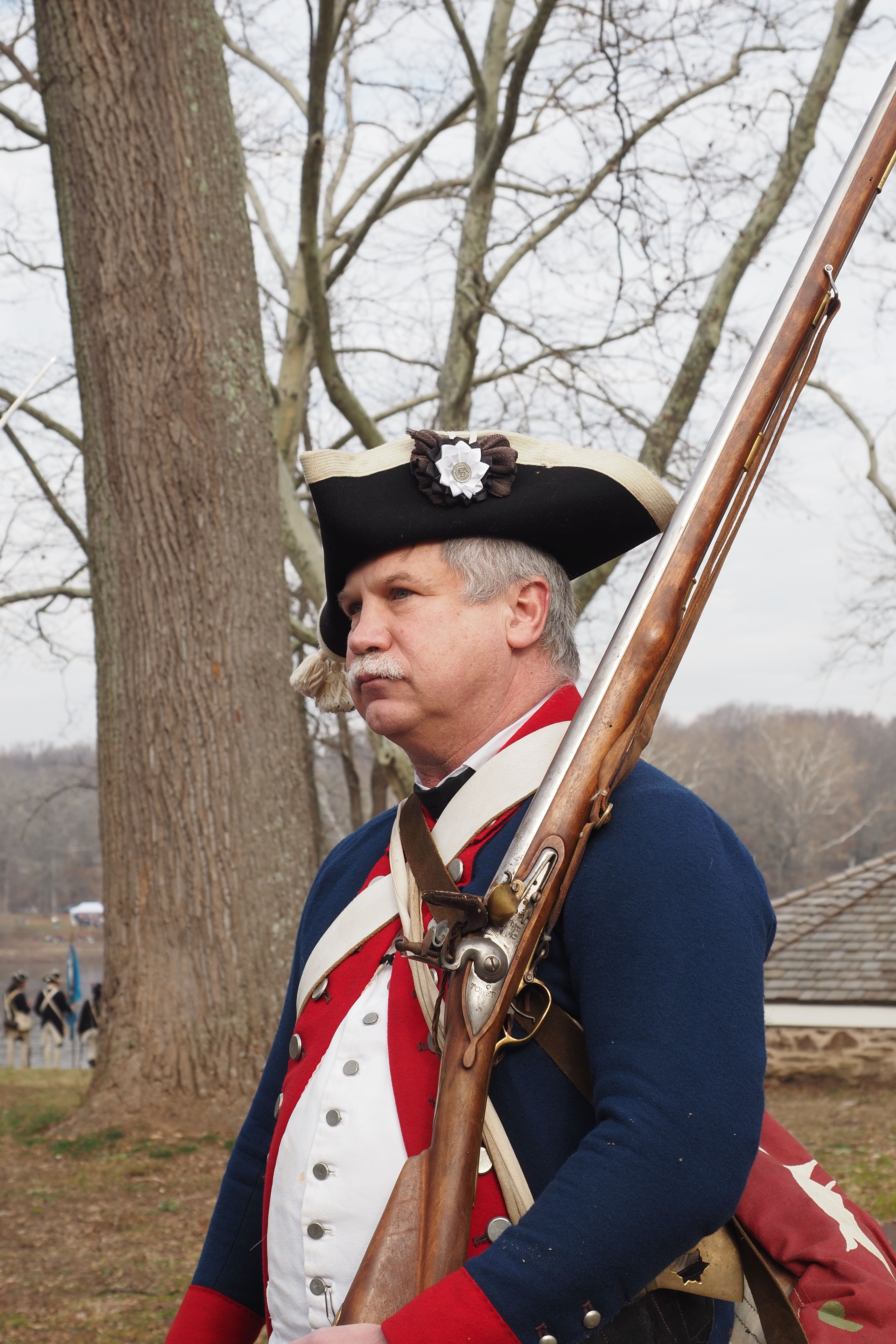Continental Army Soldier Holding Musket on Shoulder · Free Stock Photo