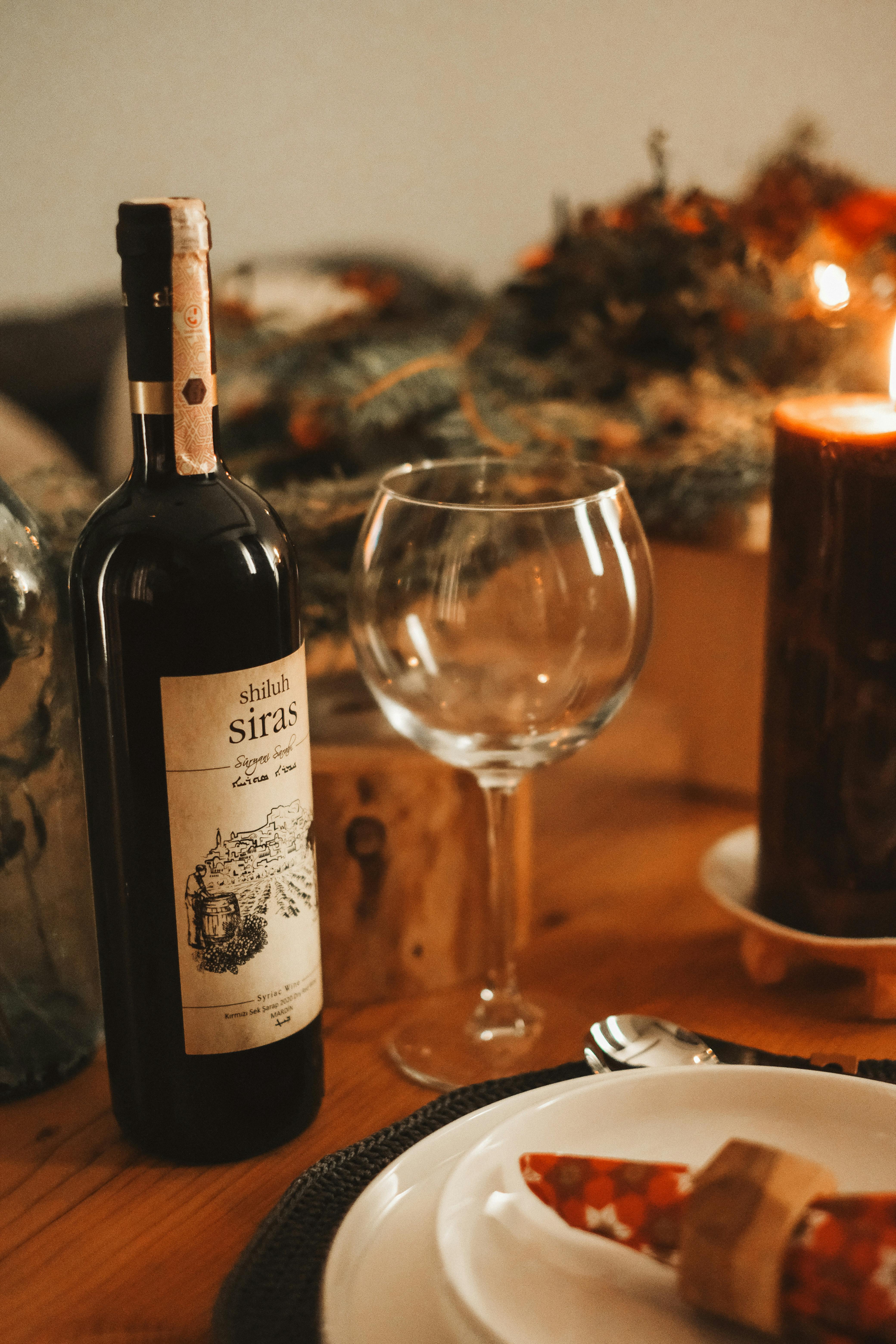 Wine Bottle on Table · Free Stock Photo