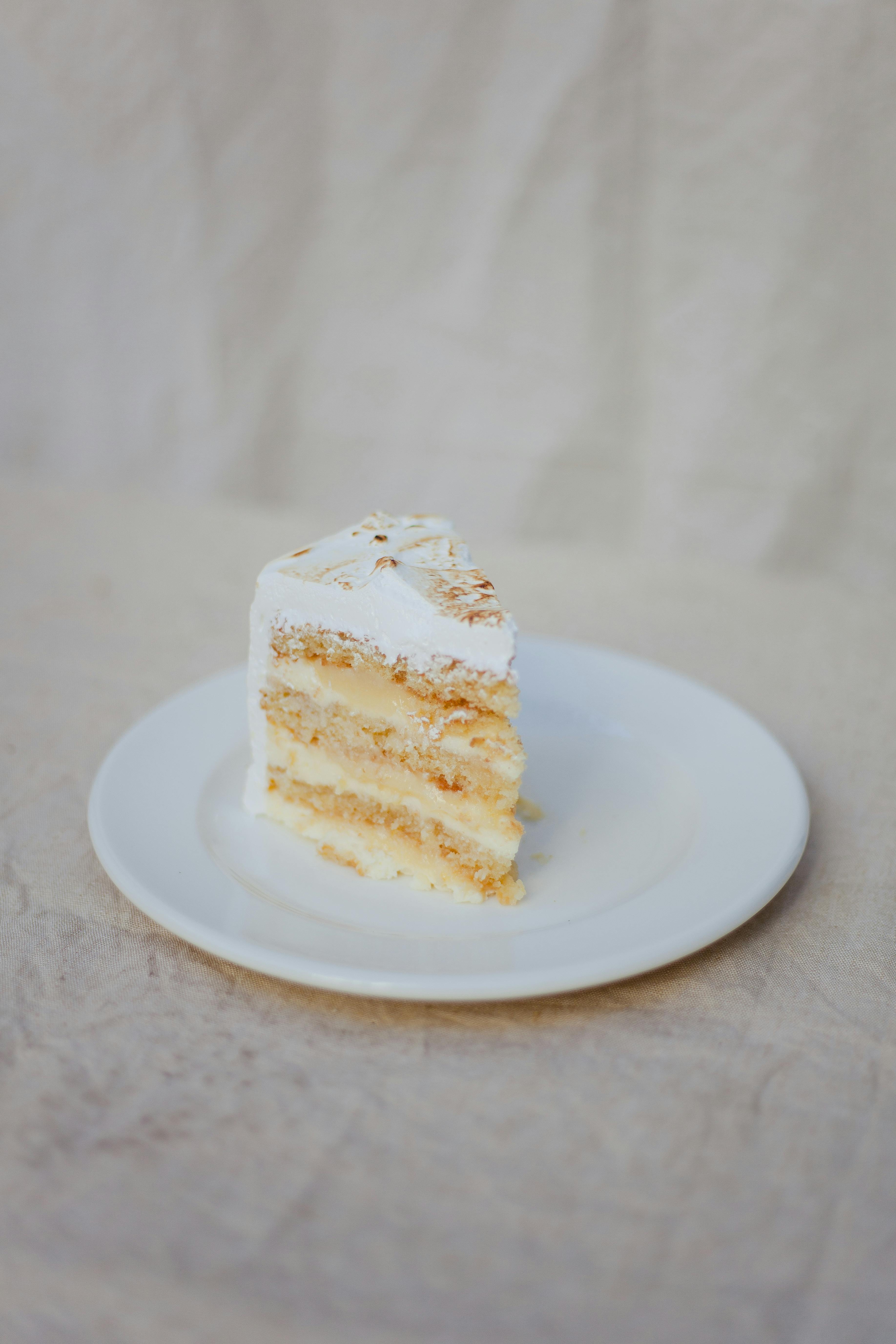 Baked Food on White Ceramic Plate Close-up Photography · Free Stock Photo